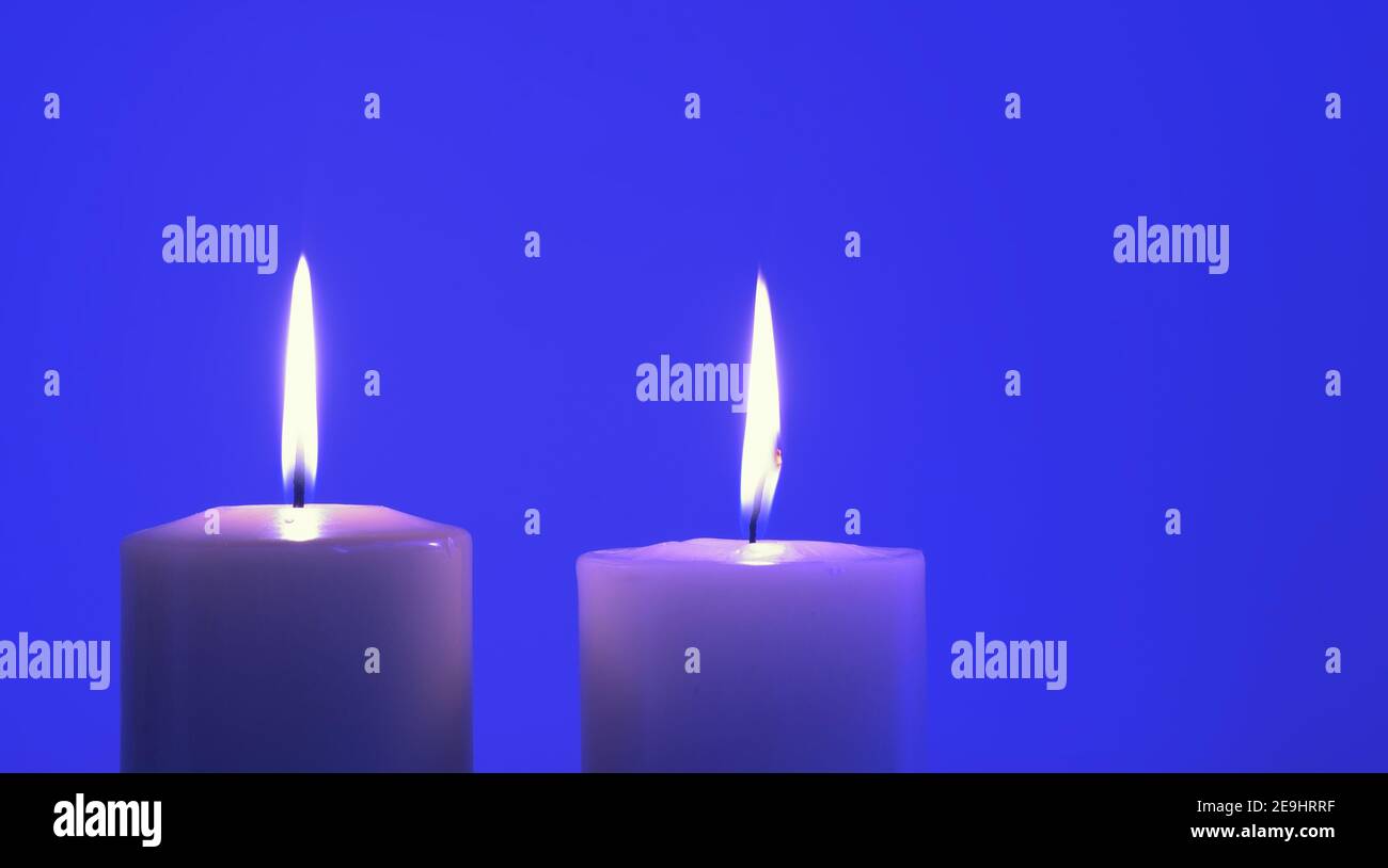 still-life with two burning candles Stock Photo - Alamy
