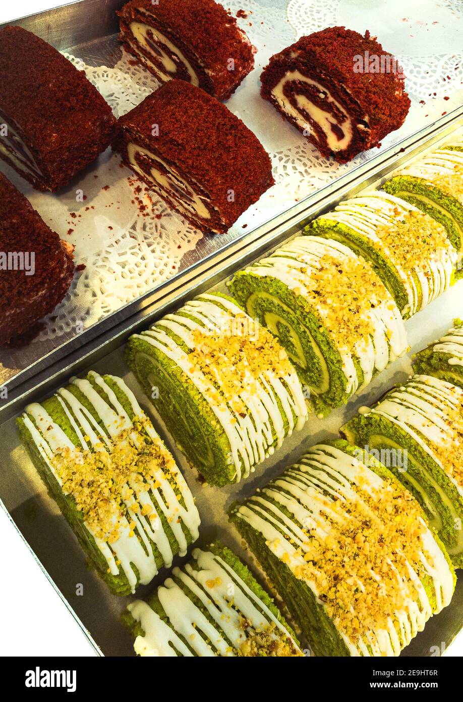 cut roll cakes at sale Stock Photo - Alamy