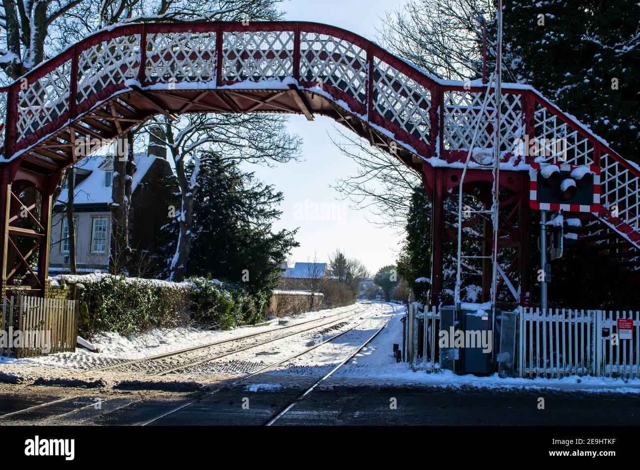 OAKHAM, RUTLAND, ENGLAND- 25 JANUARY 2021: Oakham level crossing on a ...