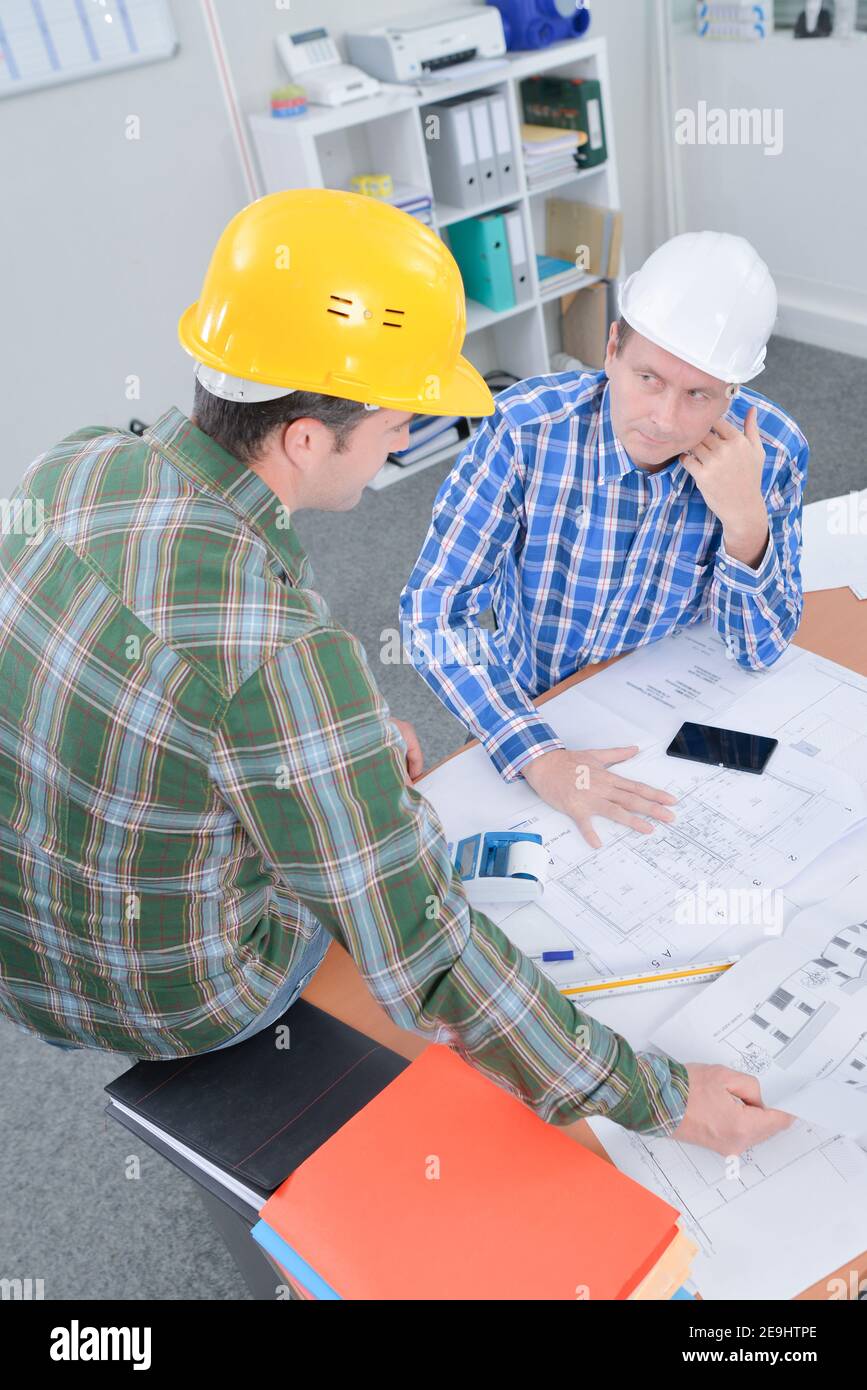 Final check of the plans Stock Photo - Alamy