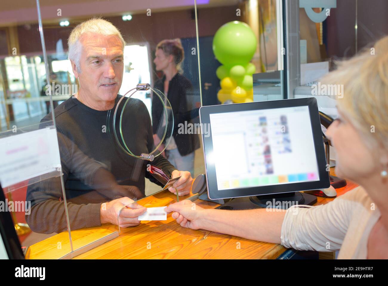 man holding or showing two cinema tickets booking ticket concept Stock ...