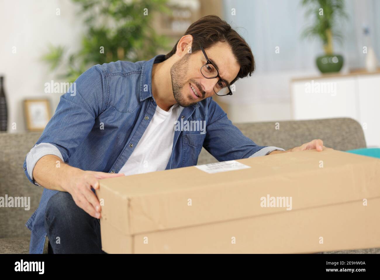 Receiving delivery asia hi-res stock photography and images - Alamy
