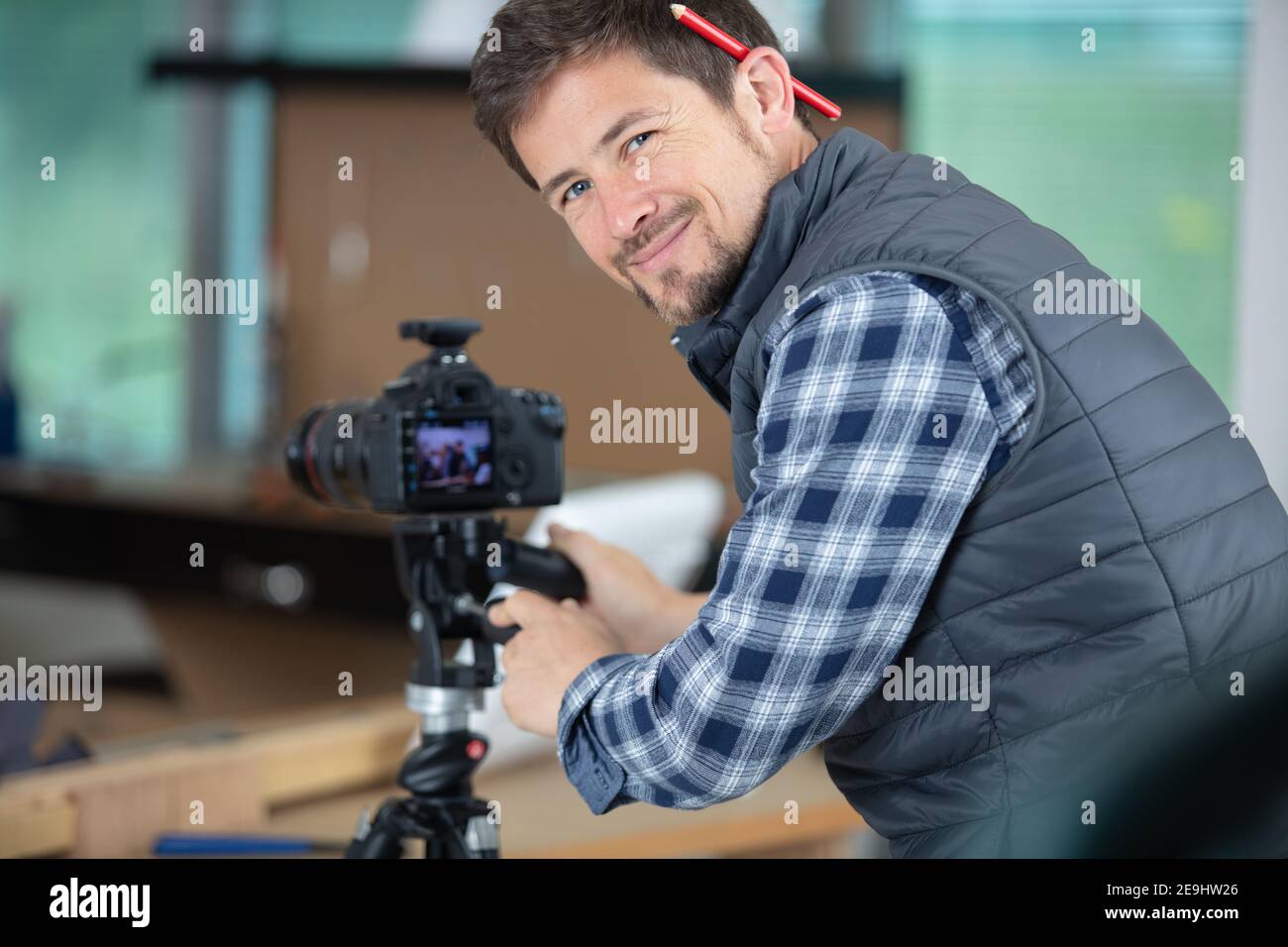 vlogger recording computer repair on camera for vlog blog Stock Photo ...