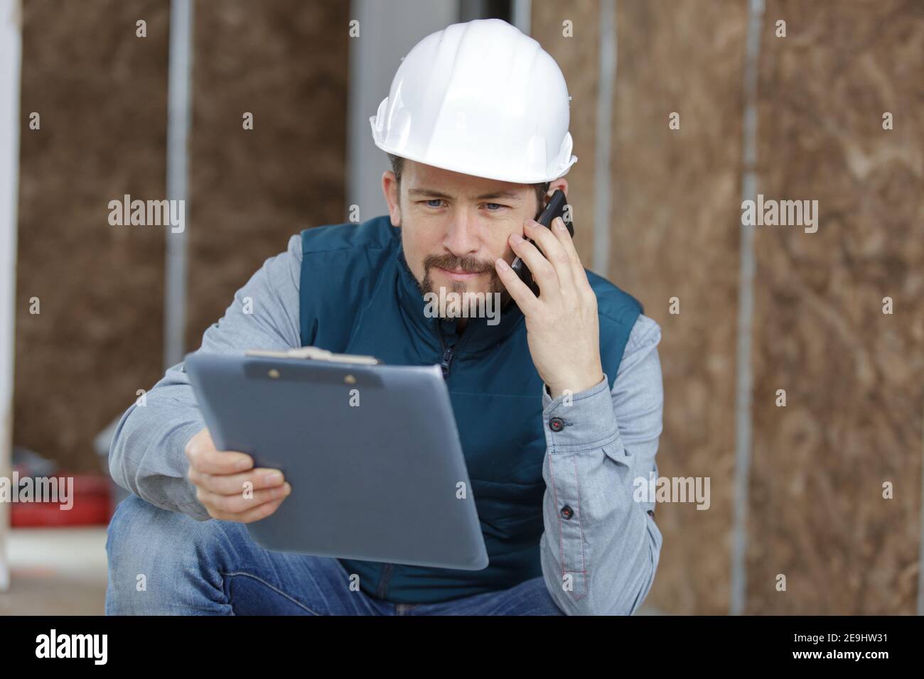engineer talks on the phone Stock Photo - Alamy