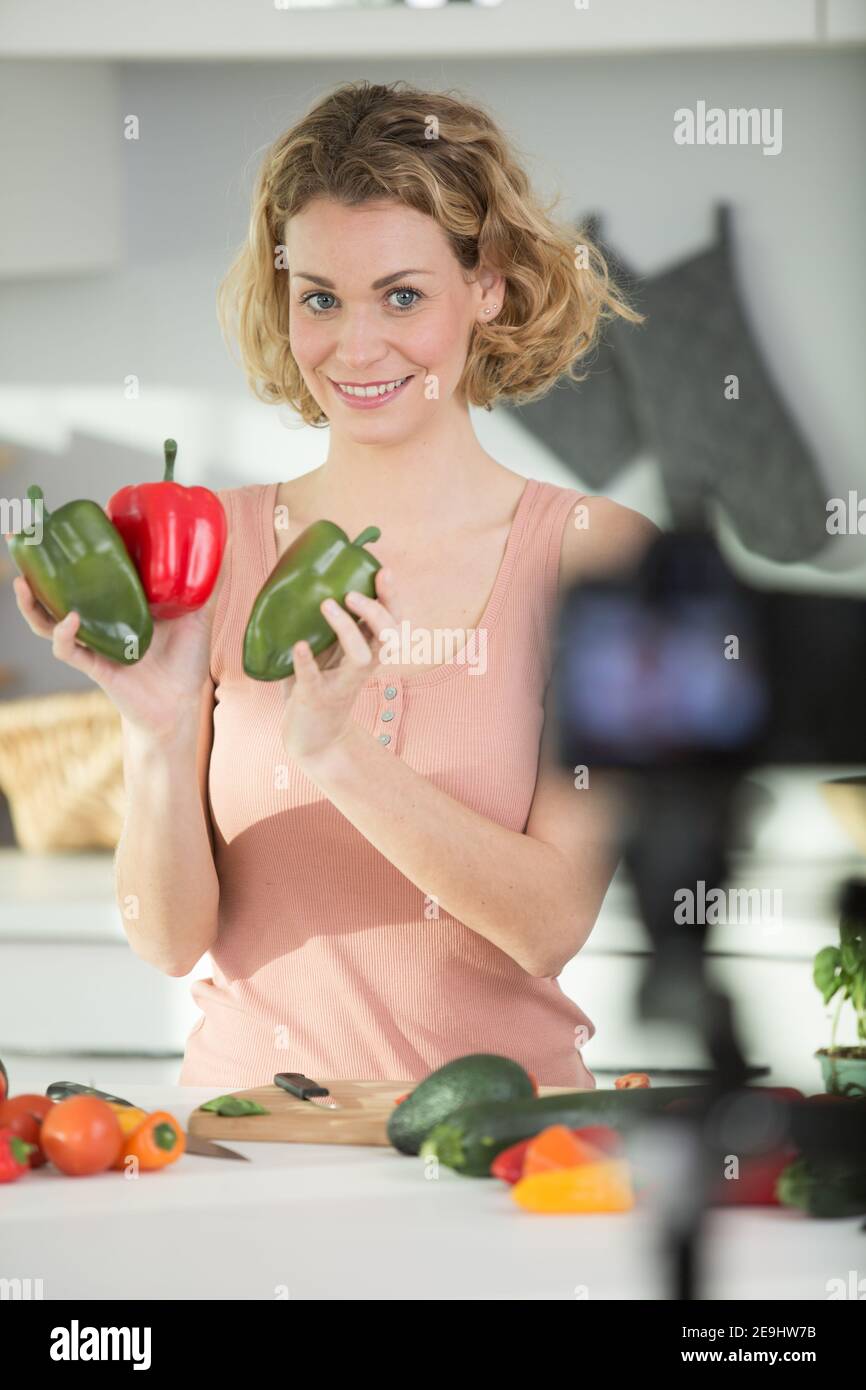 woman in the kitchen and preparing a food vlogging Stock Photo - Alamy