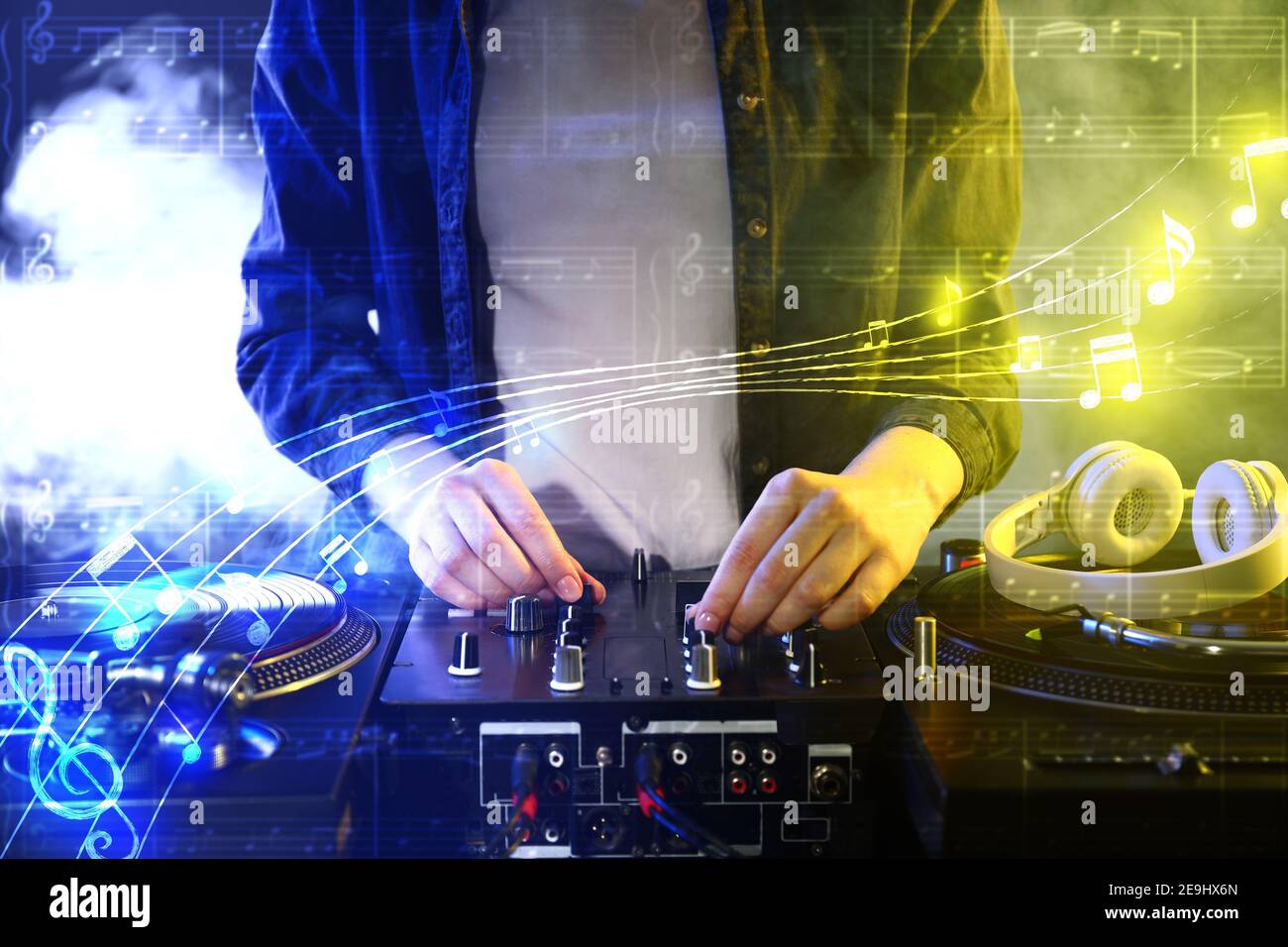 Female DJ mixing music in night club Stock Photo - Alamy