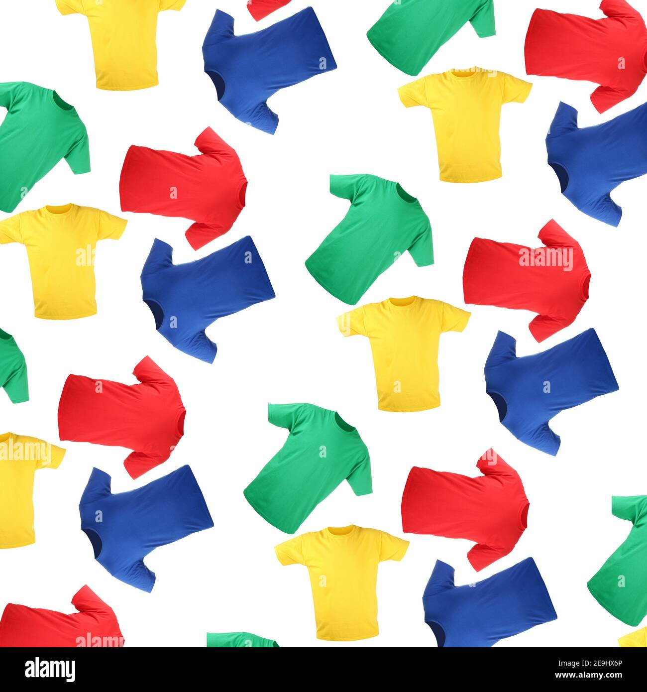 Many bright t-shirts on white background Stock Photo - Alamy