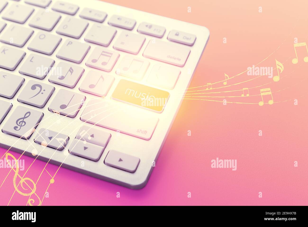 Computer keyboard and flying music notes on color background Stock ...