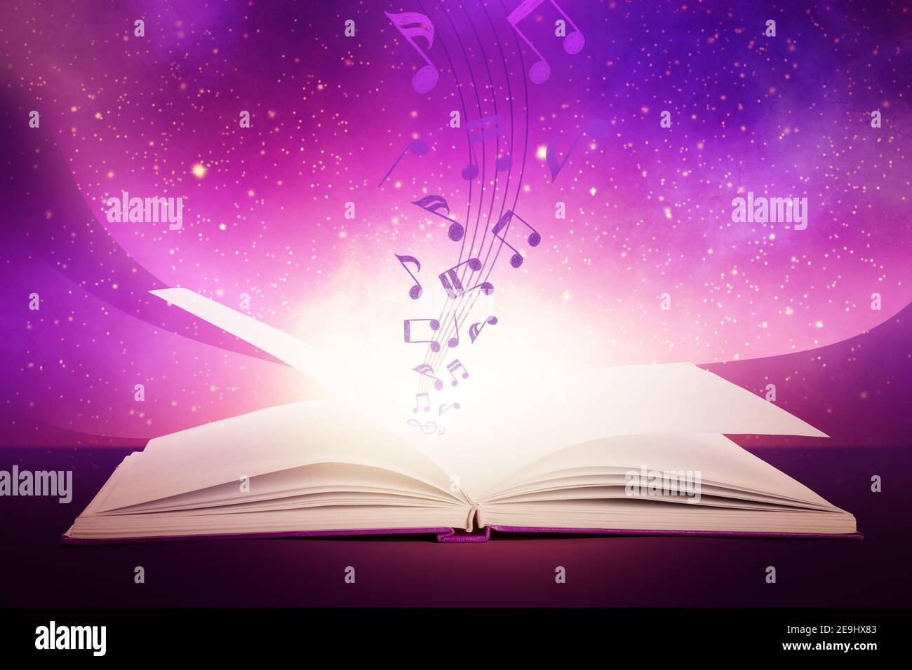 Open book with flying music notes on color background Stock Photo - Alamy