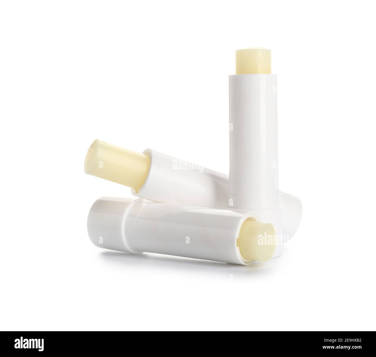Natural lip balms on white background Stock Photo - Alamy