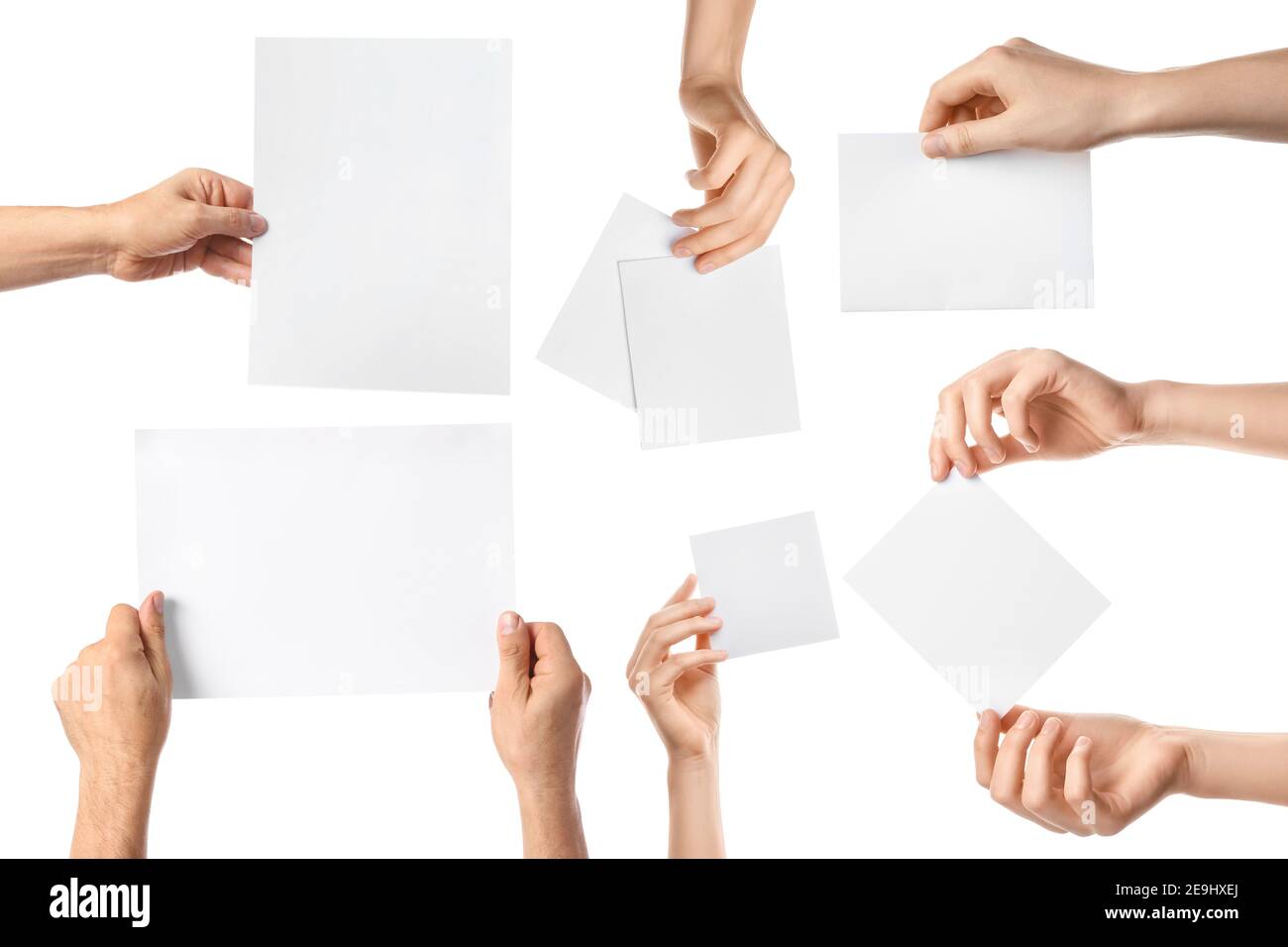 Set of male and female hands with blank paper sheets on white ...