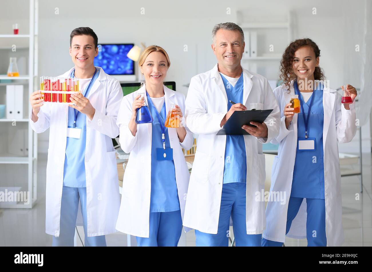 Group of scientists in modern laboratory Stock Photo - Alamy