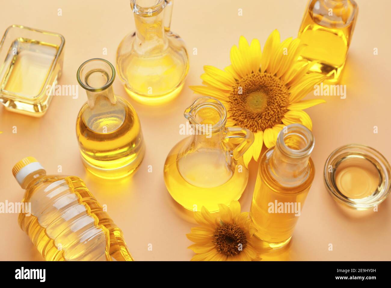 Composition with sunflower oil on light background Stock Photo - Alamy