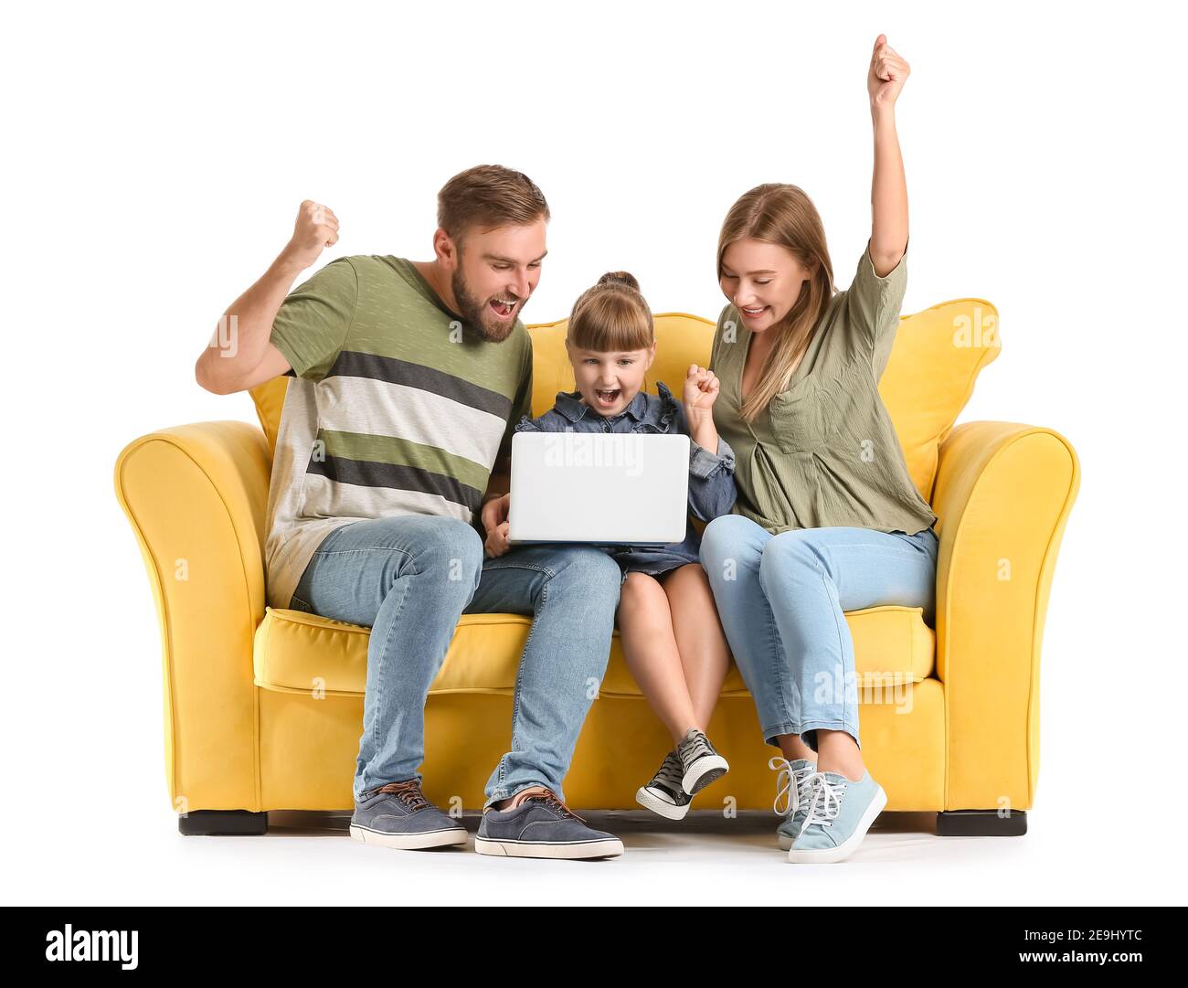 Happy family with laptop on sofa against white background Stock Photo ...
