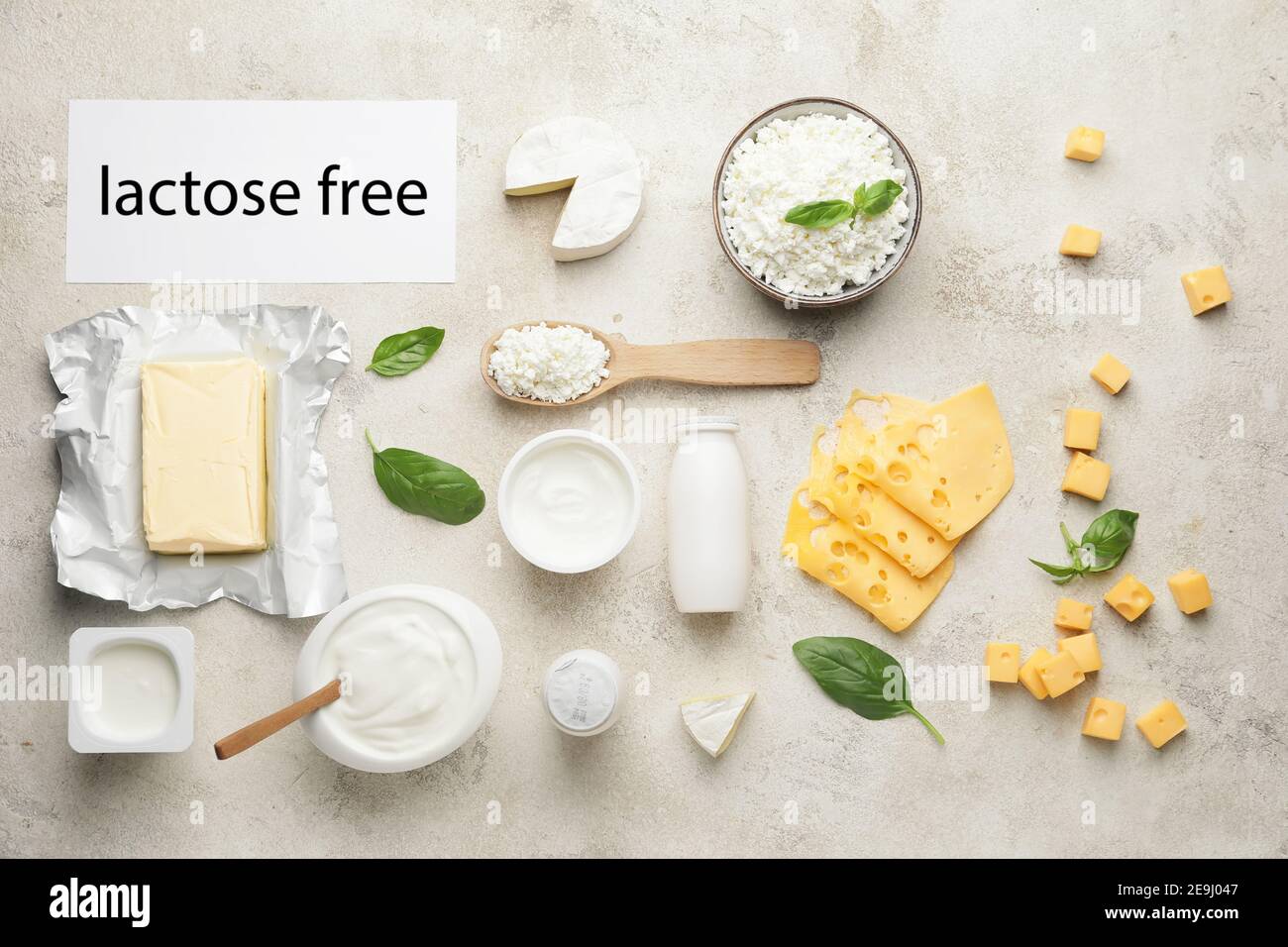 Different dairy products without lactose on light background Stock ...