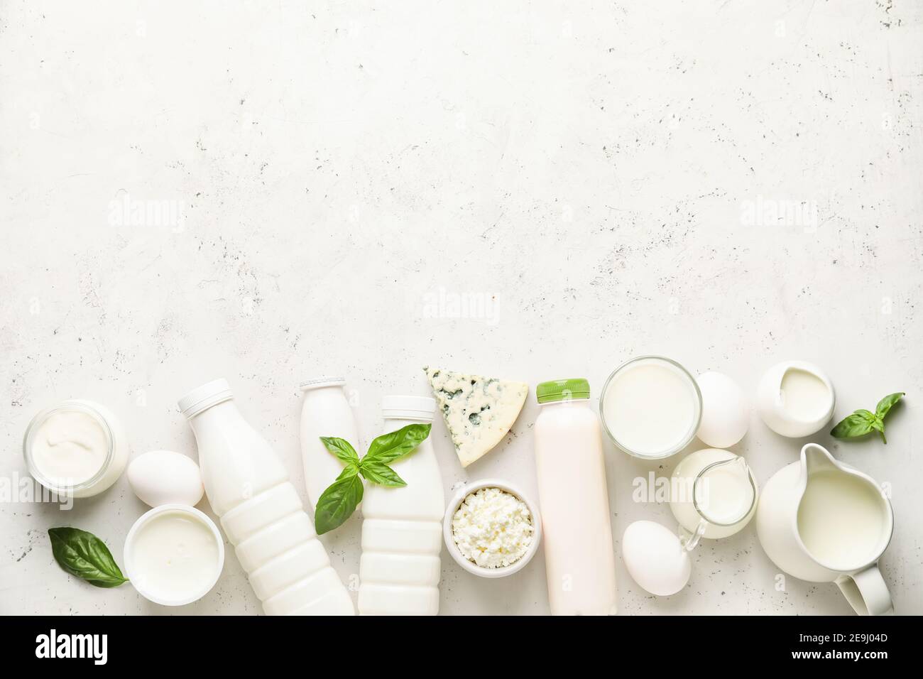 Different dairy products on light background Stock Photo - Alamy