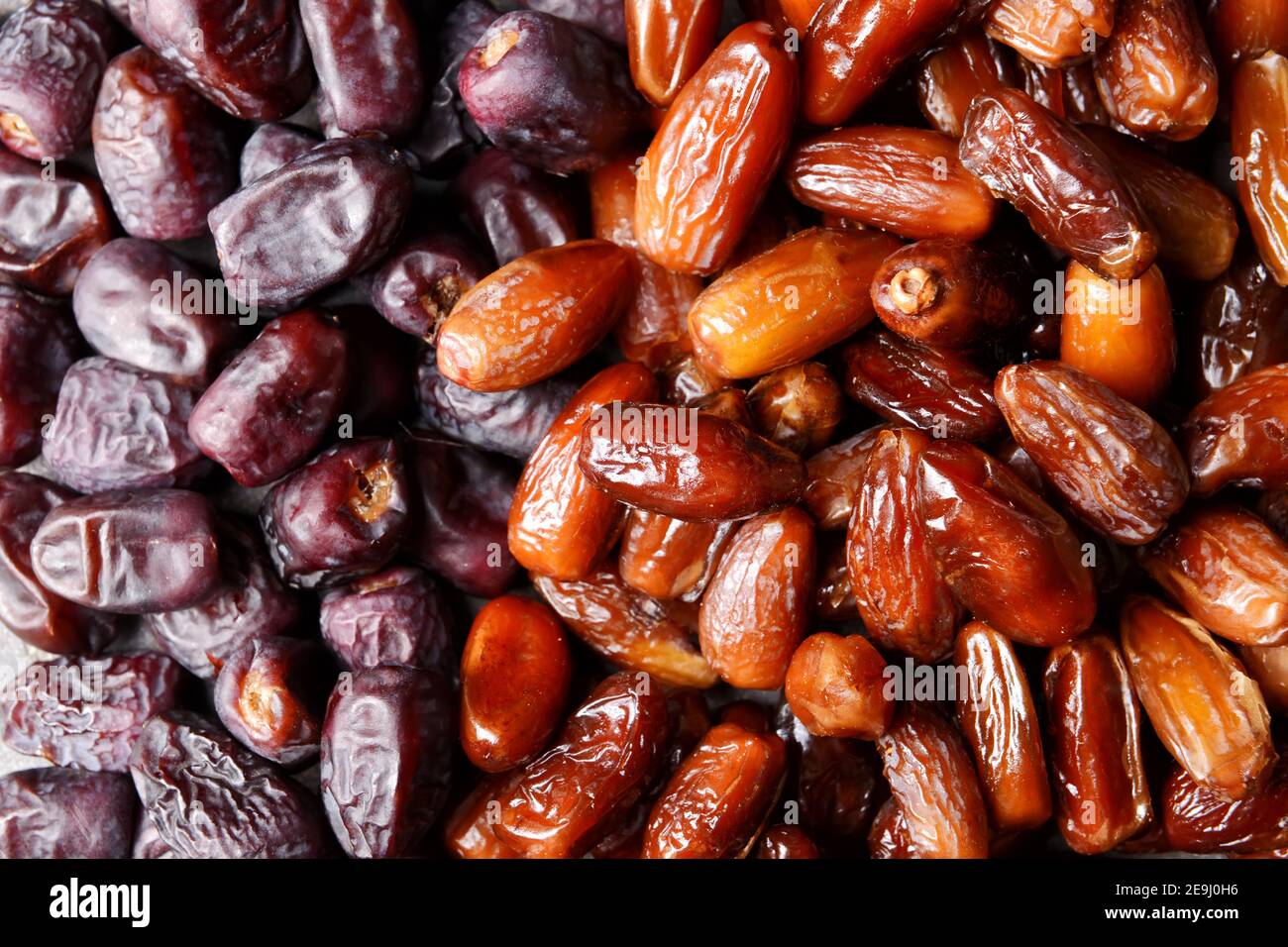 Sweet dried dates as background Stock Photo - Alamy