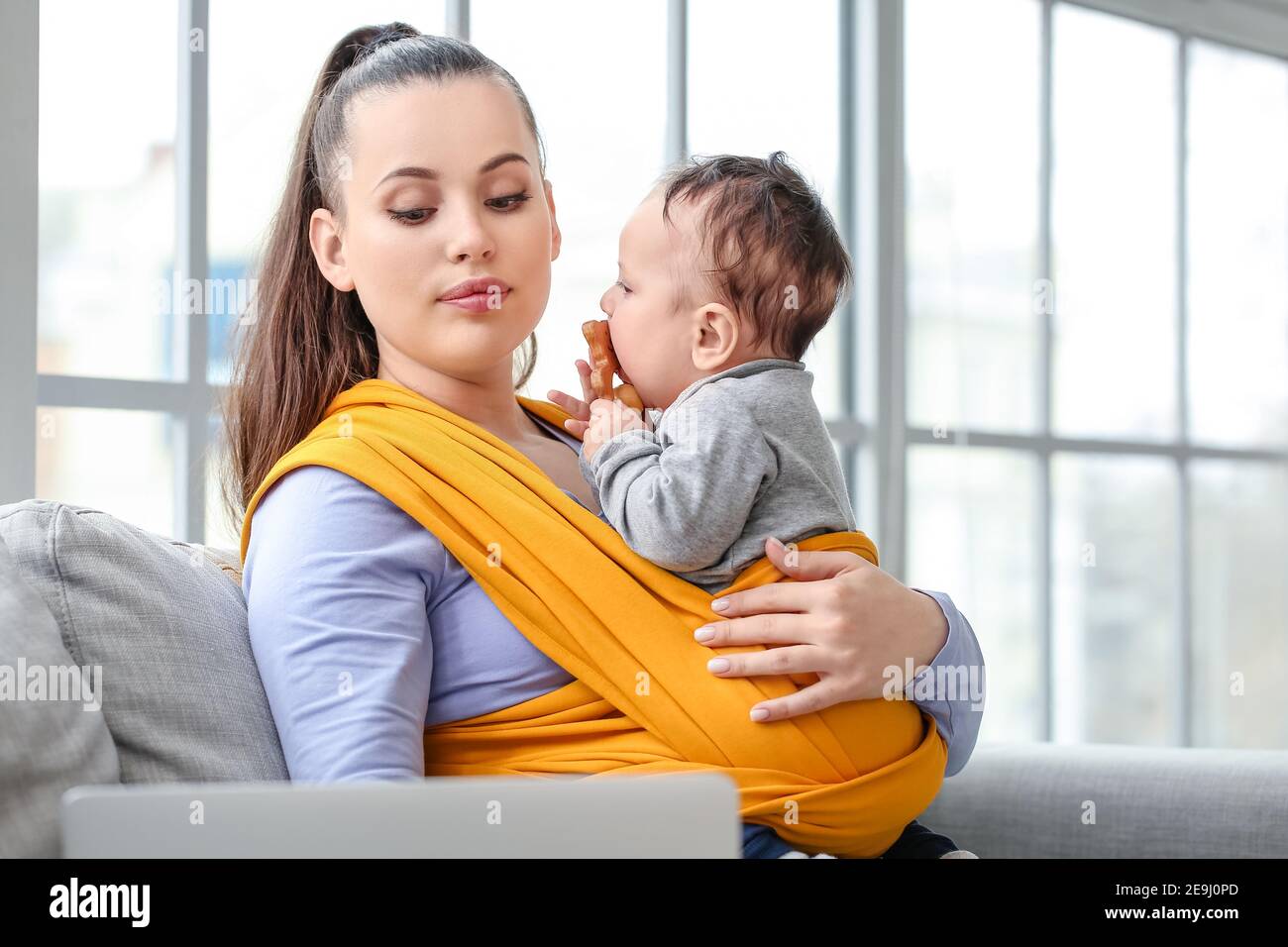 Woman baby sling computer hi-res stock photography and images - Alamy Woman baby sling computer hi-res stock photography and images - Alamy