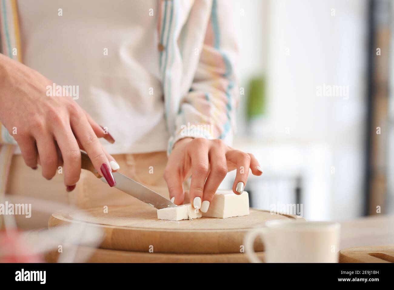 Young transgender couple cooking festive dinner at home Stock Photo - Alamy