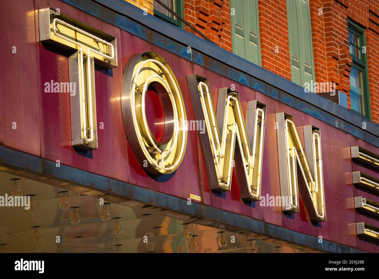 Old neon movie theater sign Stock Photo - Alamy