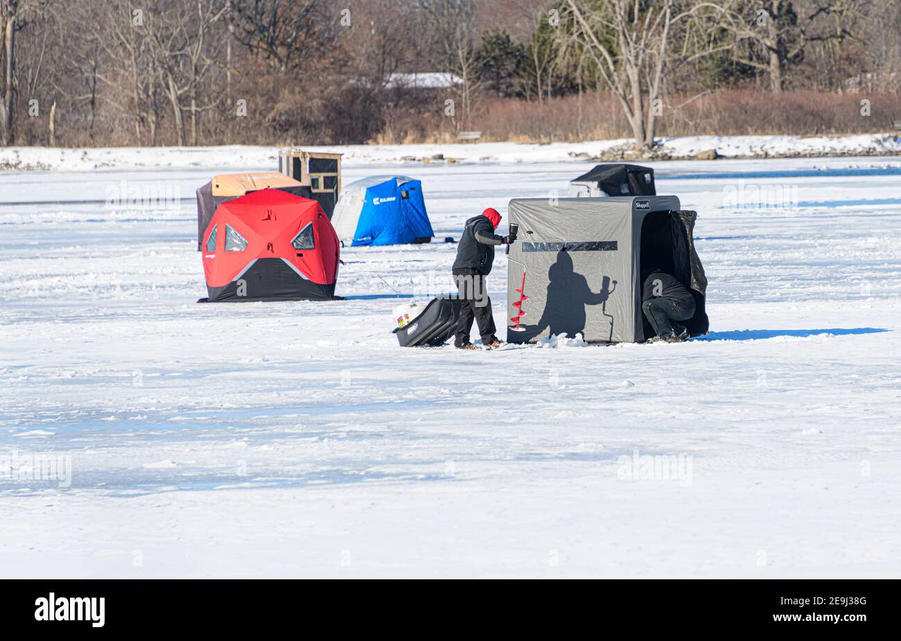 Ice fishing on a freezing day in Northwest Ohio Stock Photo - Alamy