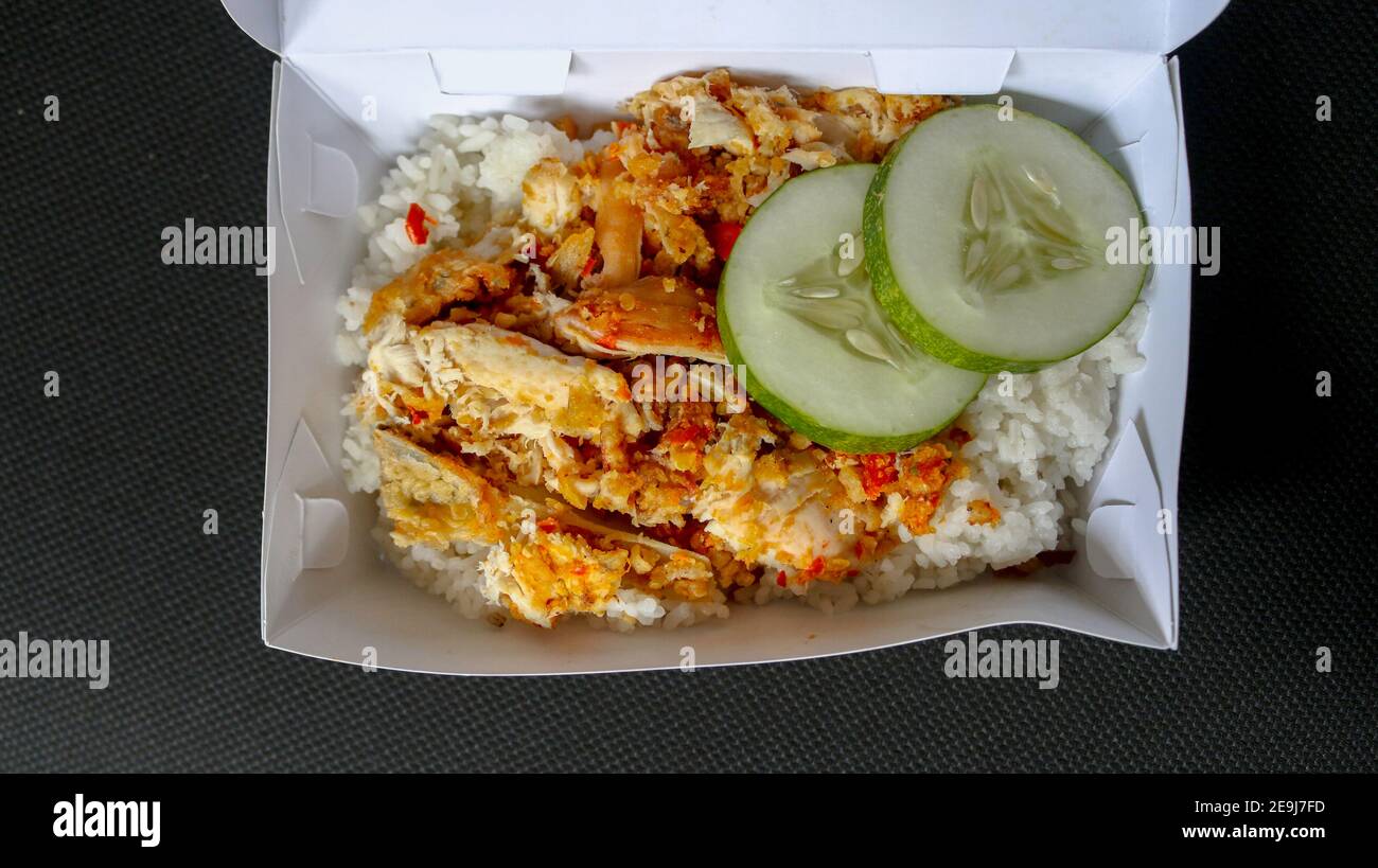 Ayam geprek or Spicy chicken crush with chilli and garlic flavour on ...