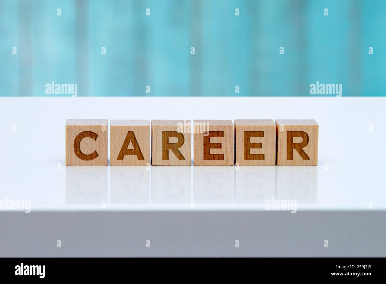 'Career' message sign on wooden blocks sitting on a white table with ...