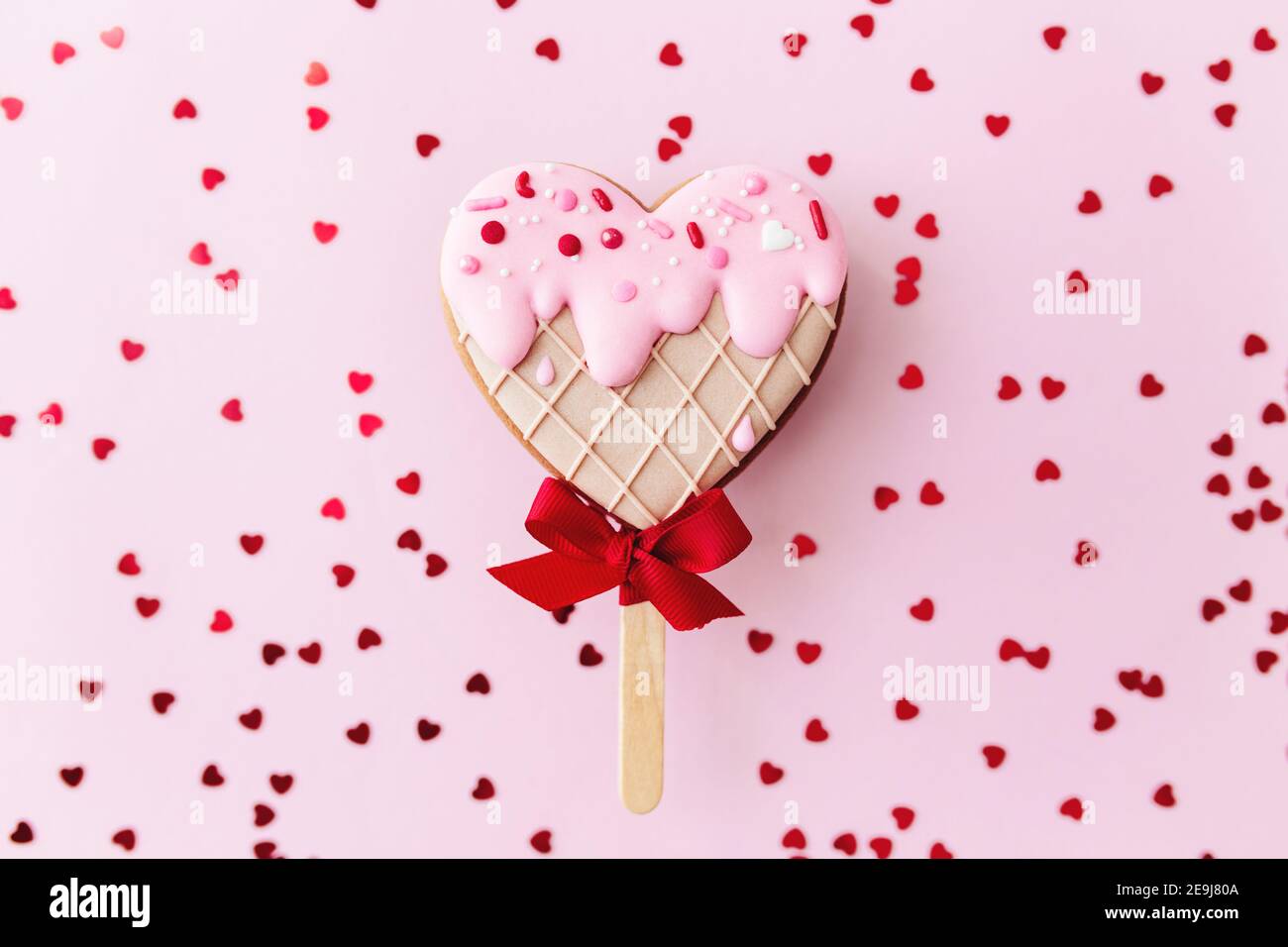 Melting ice cream heart gingerbread cookie. Valentine. Pink background ...