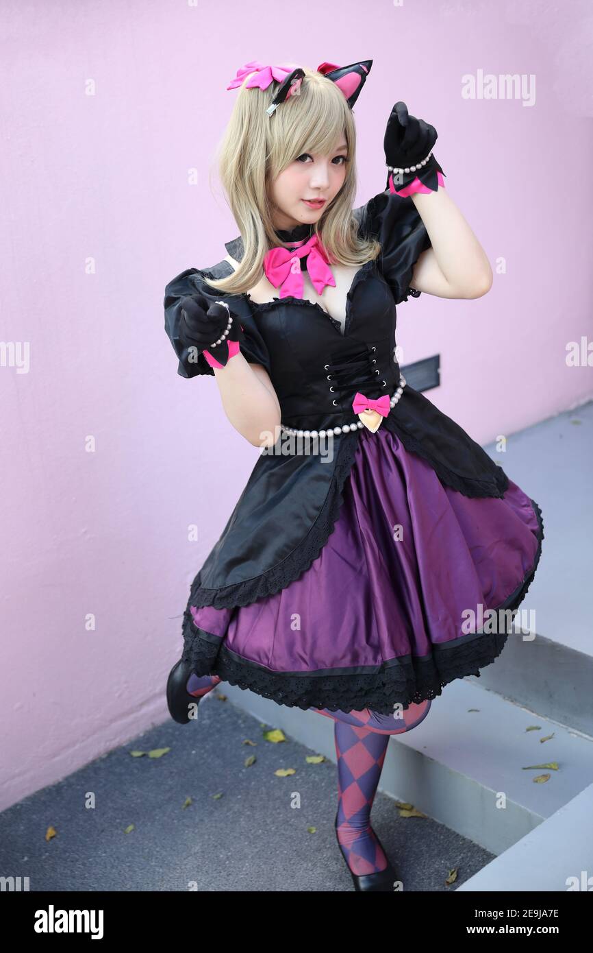 Japan anime cosplay , portrait of girl cosplay in pink room background ...