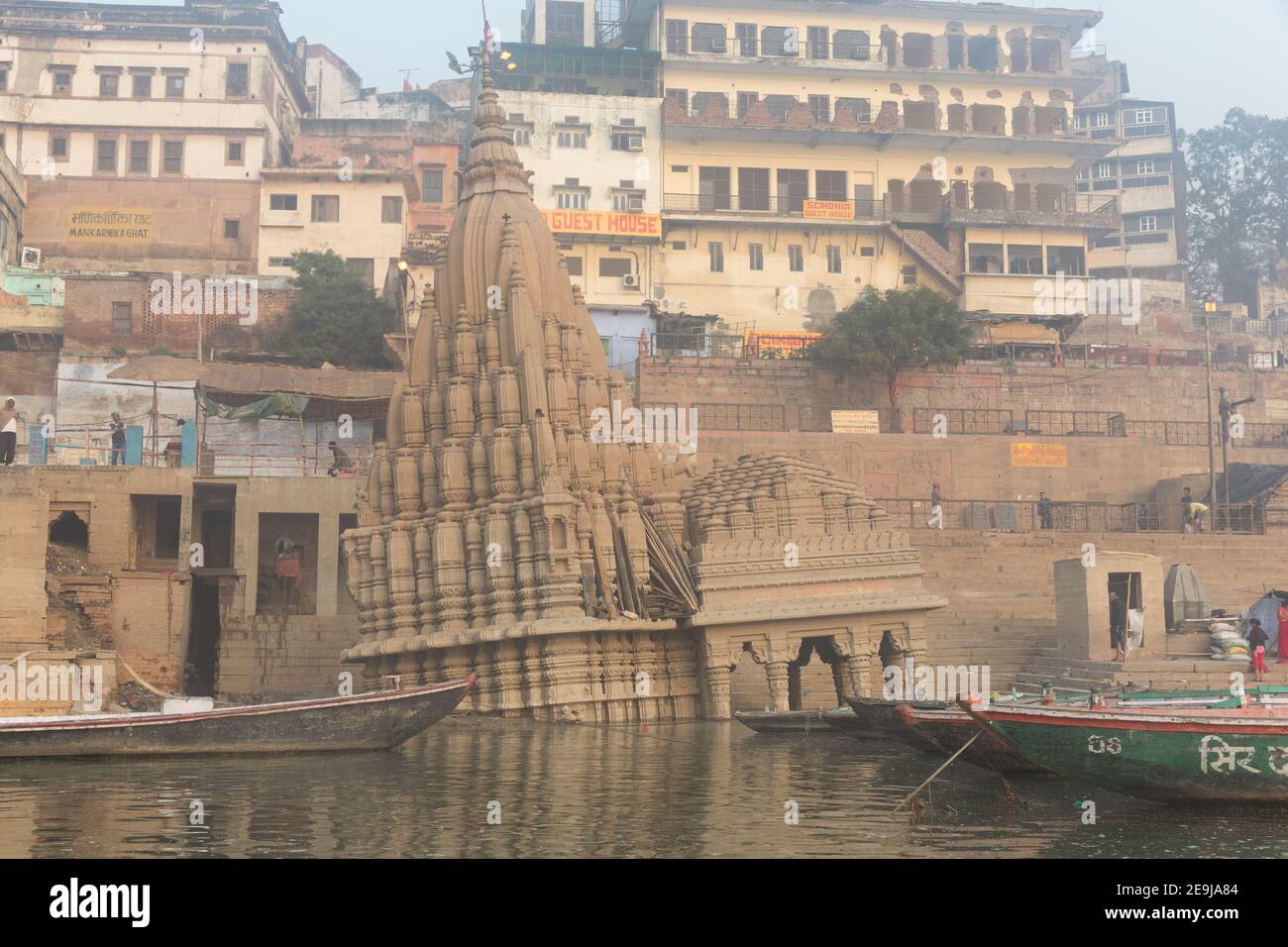 Varanasi sinking temple hi-res stock photography and images - Alamy