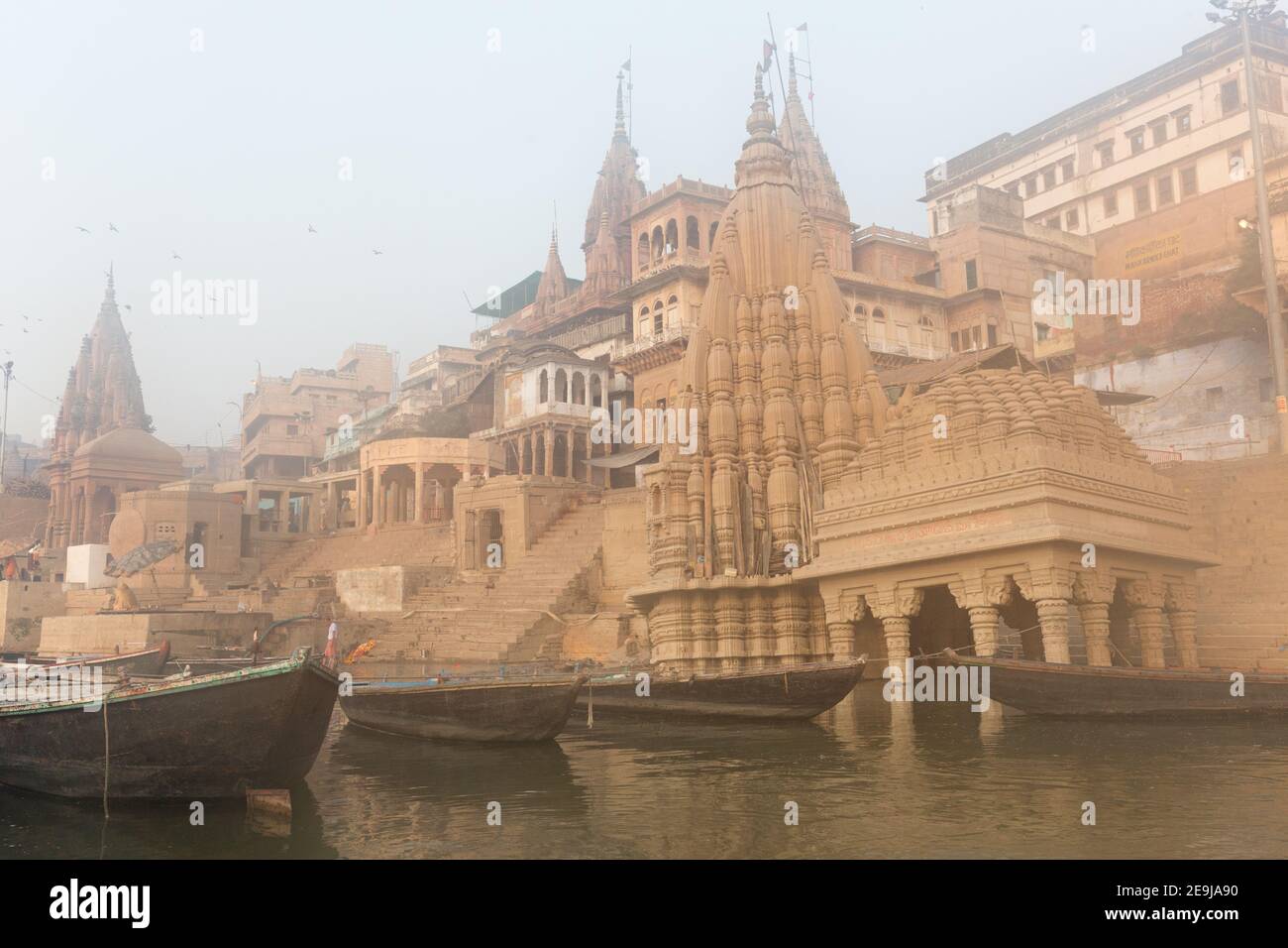 Varanasi sinking temple hi-res stock photography and images - Alamy