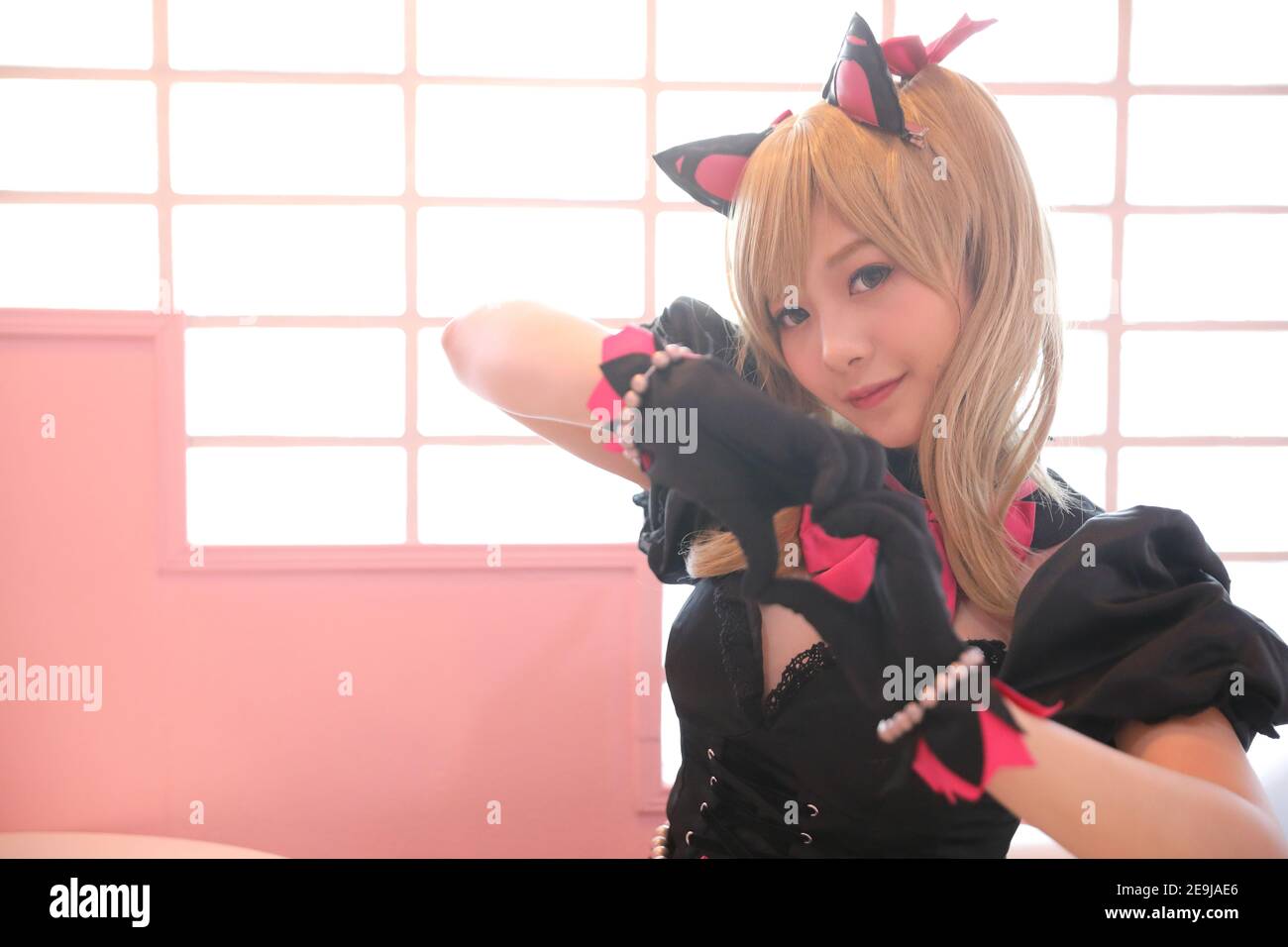 Japan anime cosplay , portrait of girl cosplay in pink room background ...