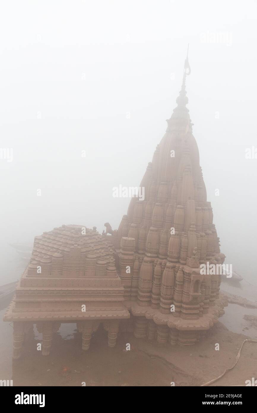 Varanasi sinking temple hi-res stock photography and images - Alamy