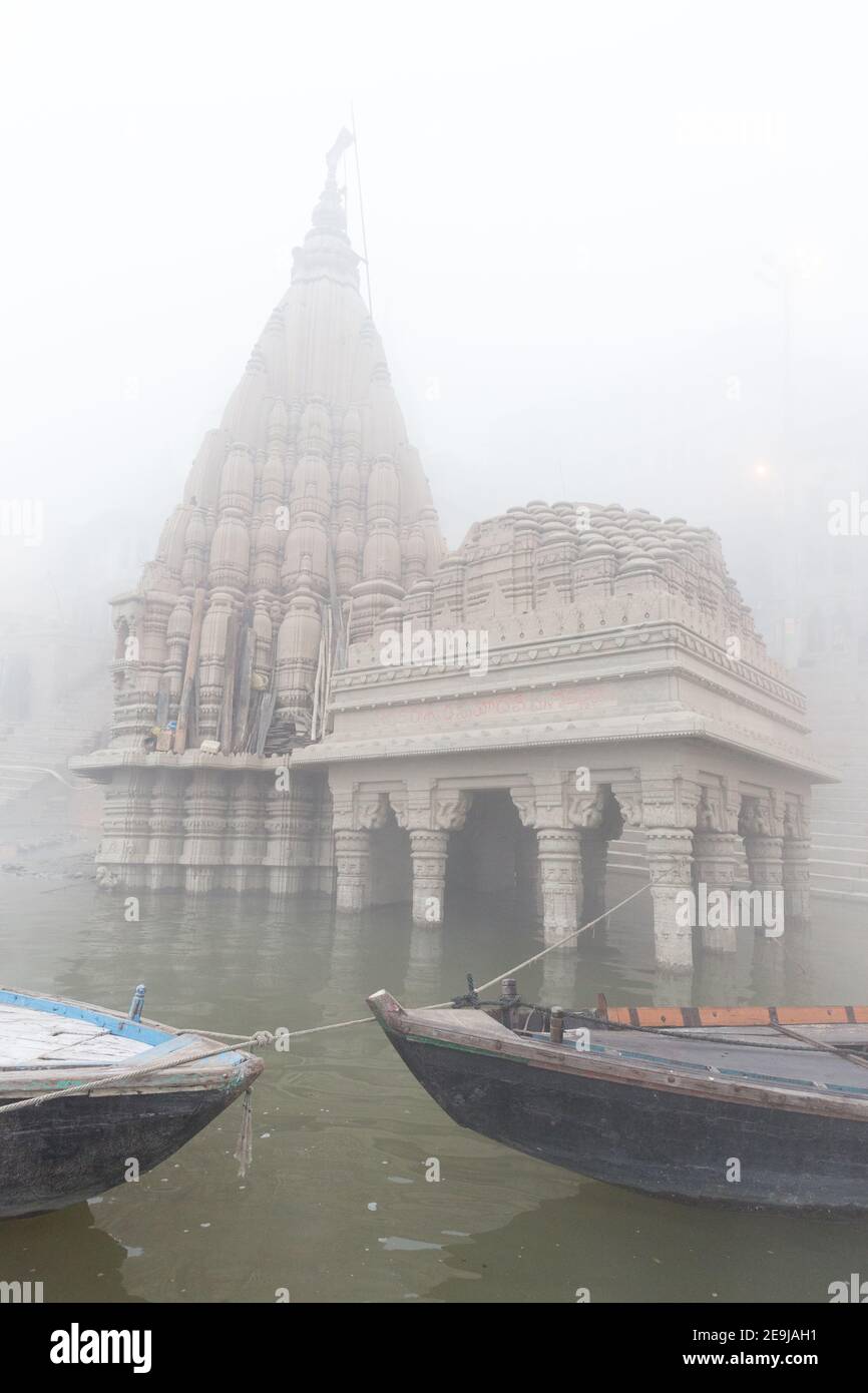 Varanasi sinking temple hi-res stock photography and images - Alamy