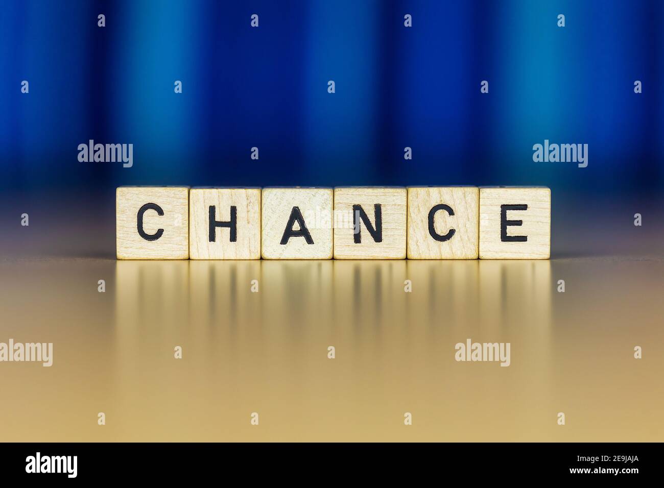 wooden cube with CHANCE word on table background. success, strategy ...