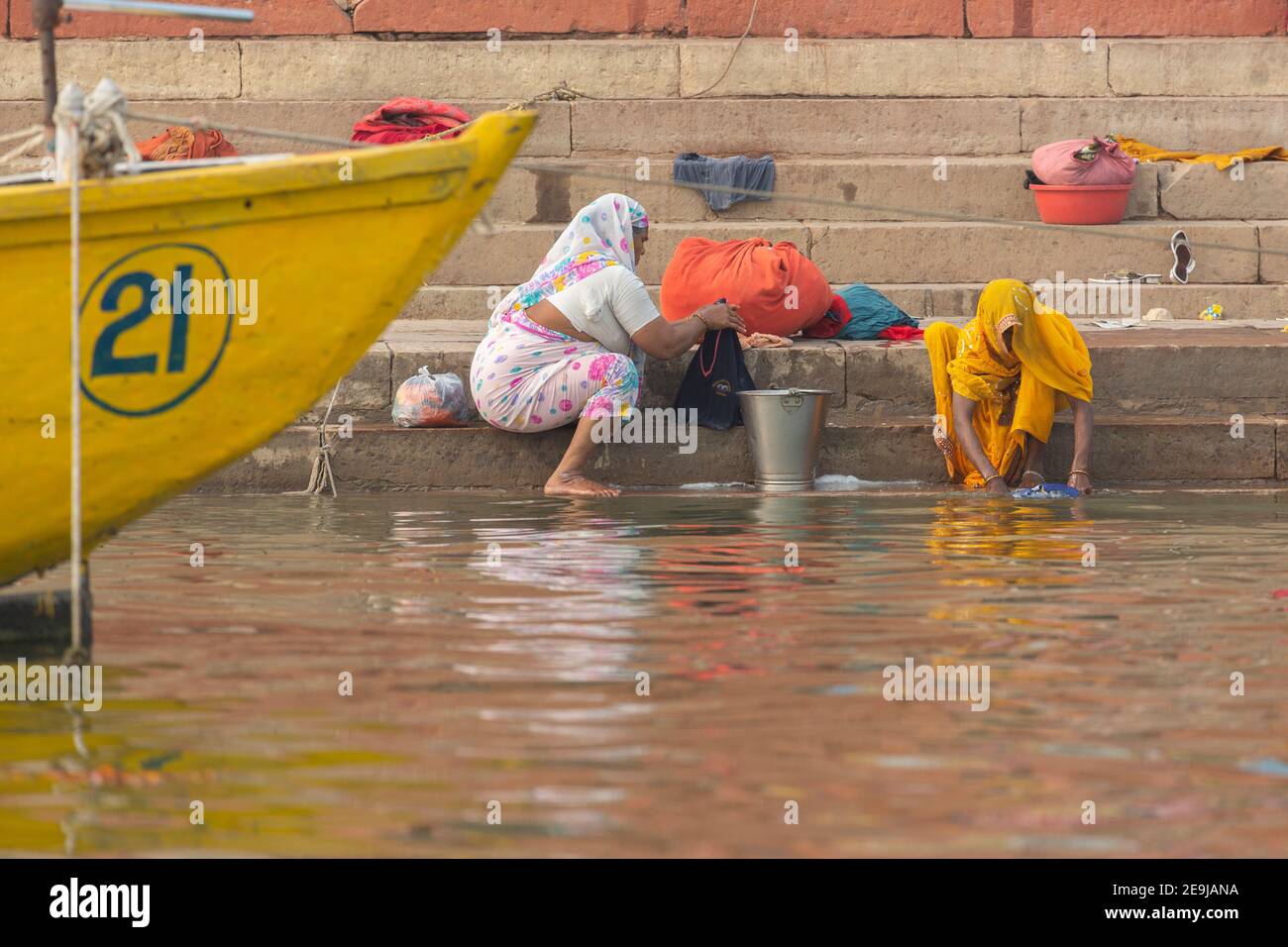 Women Washing Clothes In The Ganges River Stock Photo - Alamy