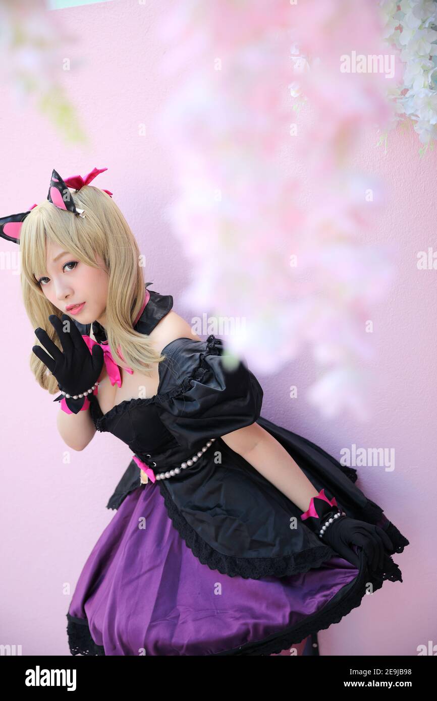 Japan anime cosplay , portrait of girl cosplay in pink room background ...
