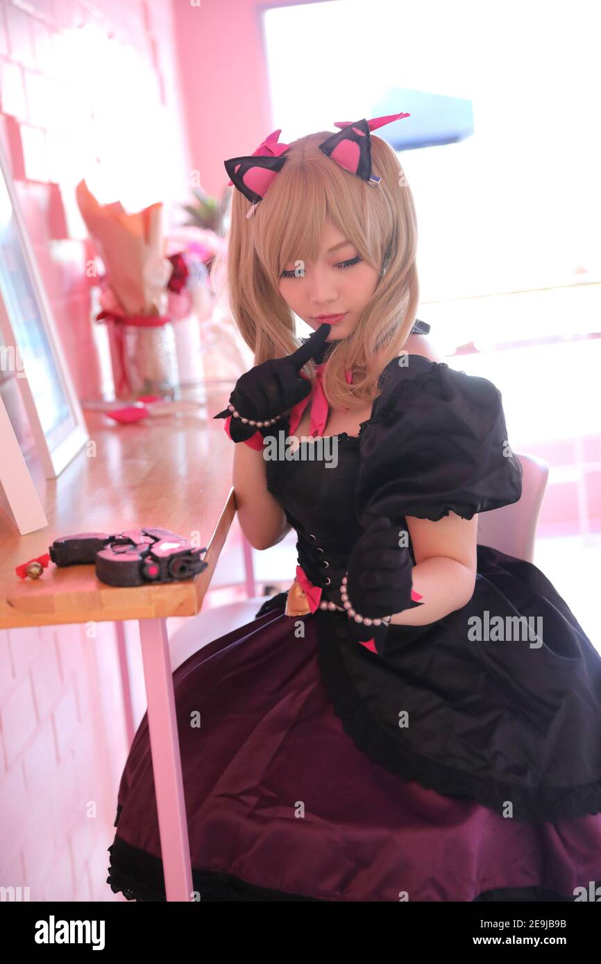 Japan anime cosplay , portrait of girl cosplay in pink room background ...