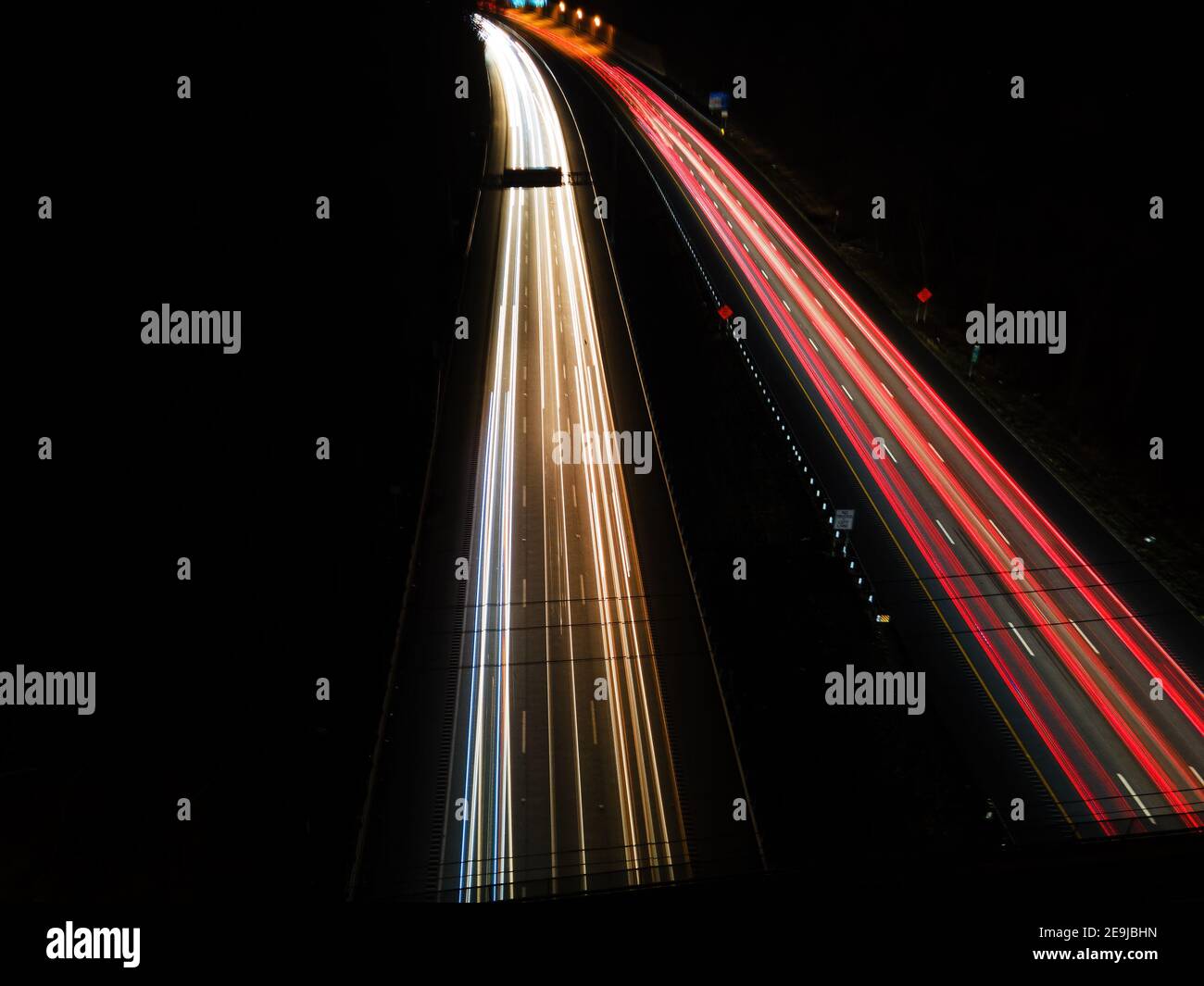 Streaking Lights from Cars on Highway at Night Stock Photo - Alamy