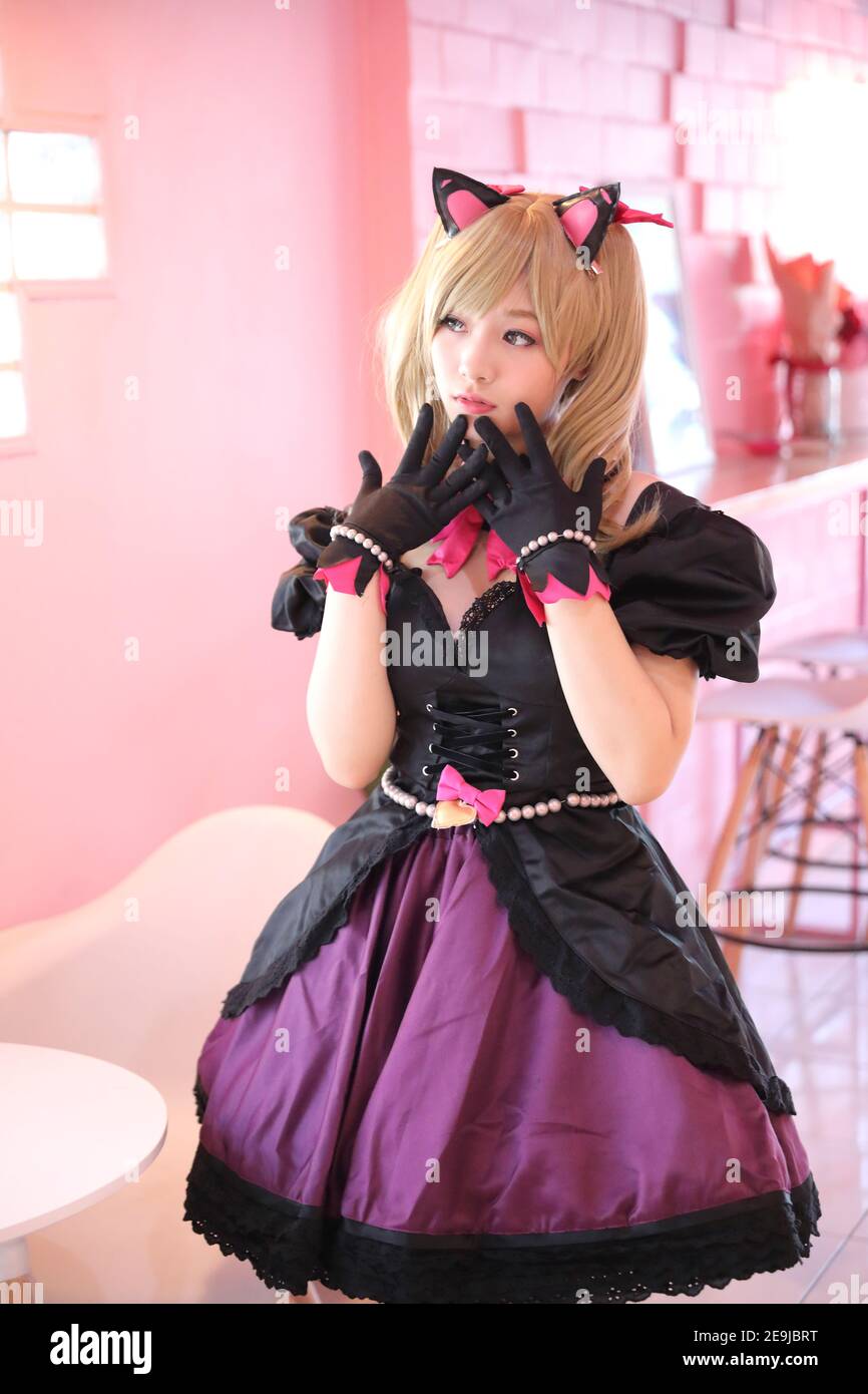 Japan anime cosplay , portrait of girl cosplay in pink room background ...