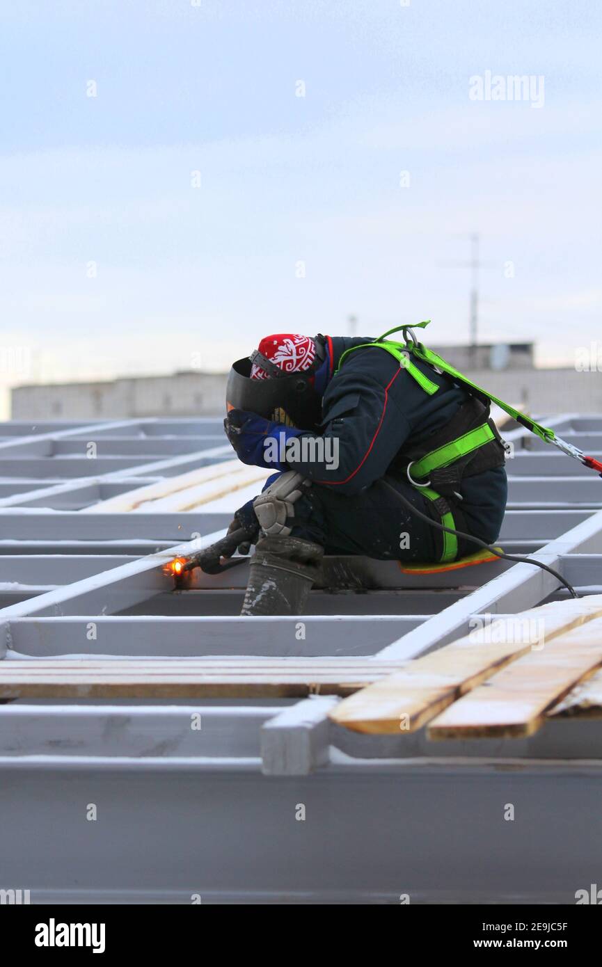 12.05.2020 Syktyvkar, Russia, Builders working on a construction site ...