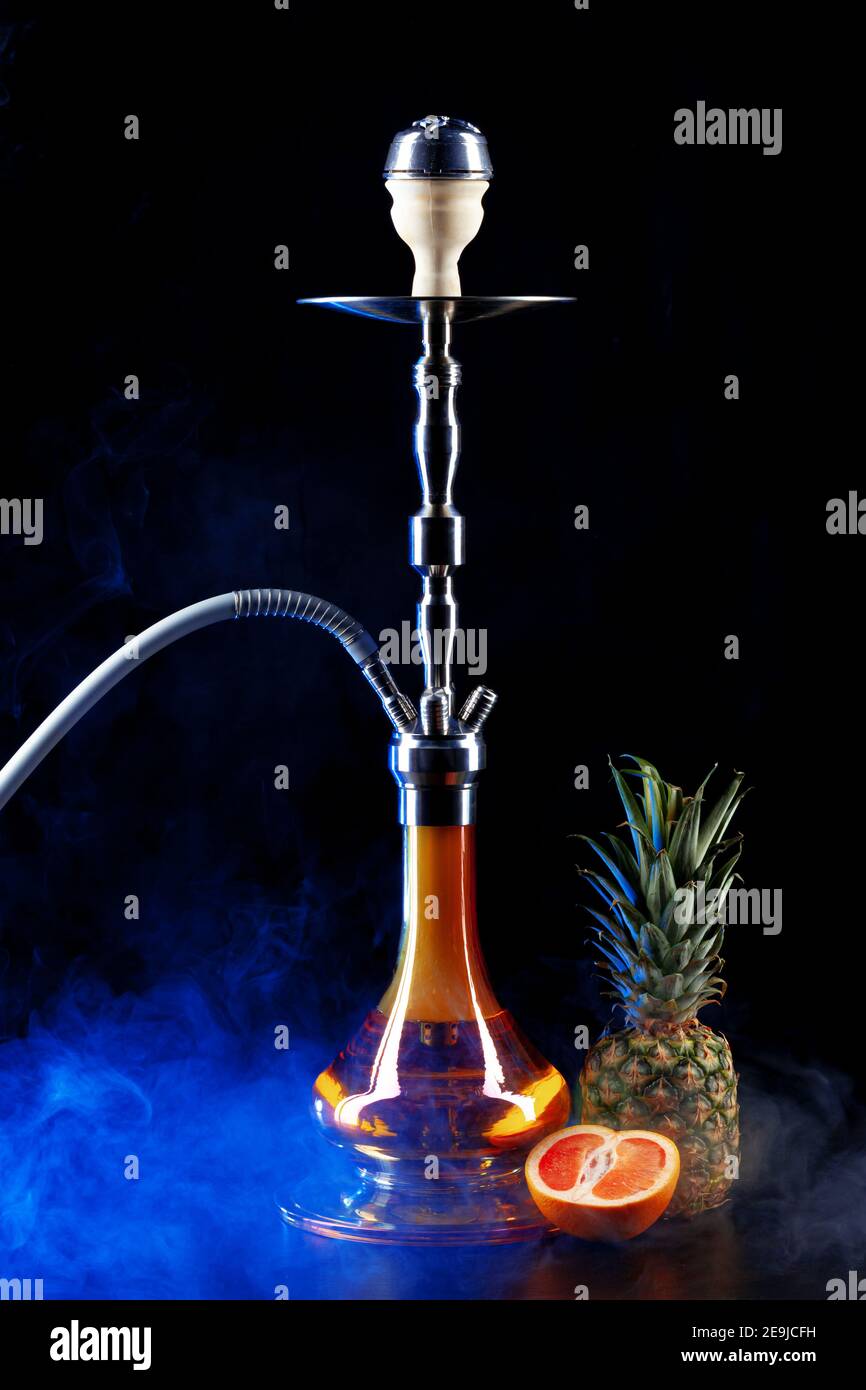 Fruit flavor hookah isolated on black background Stock Photo - Alamy