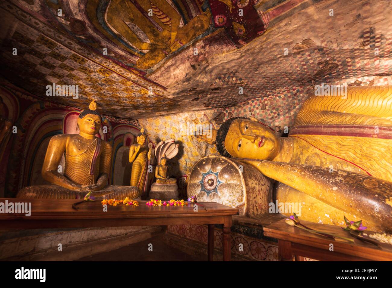 Buddha statues in Dambulla Royal Cave Temple and Golden Temple. Ancient ...
