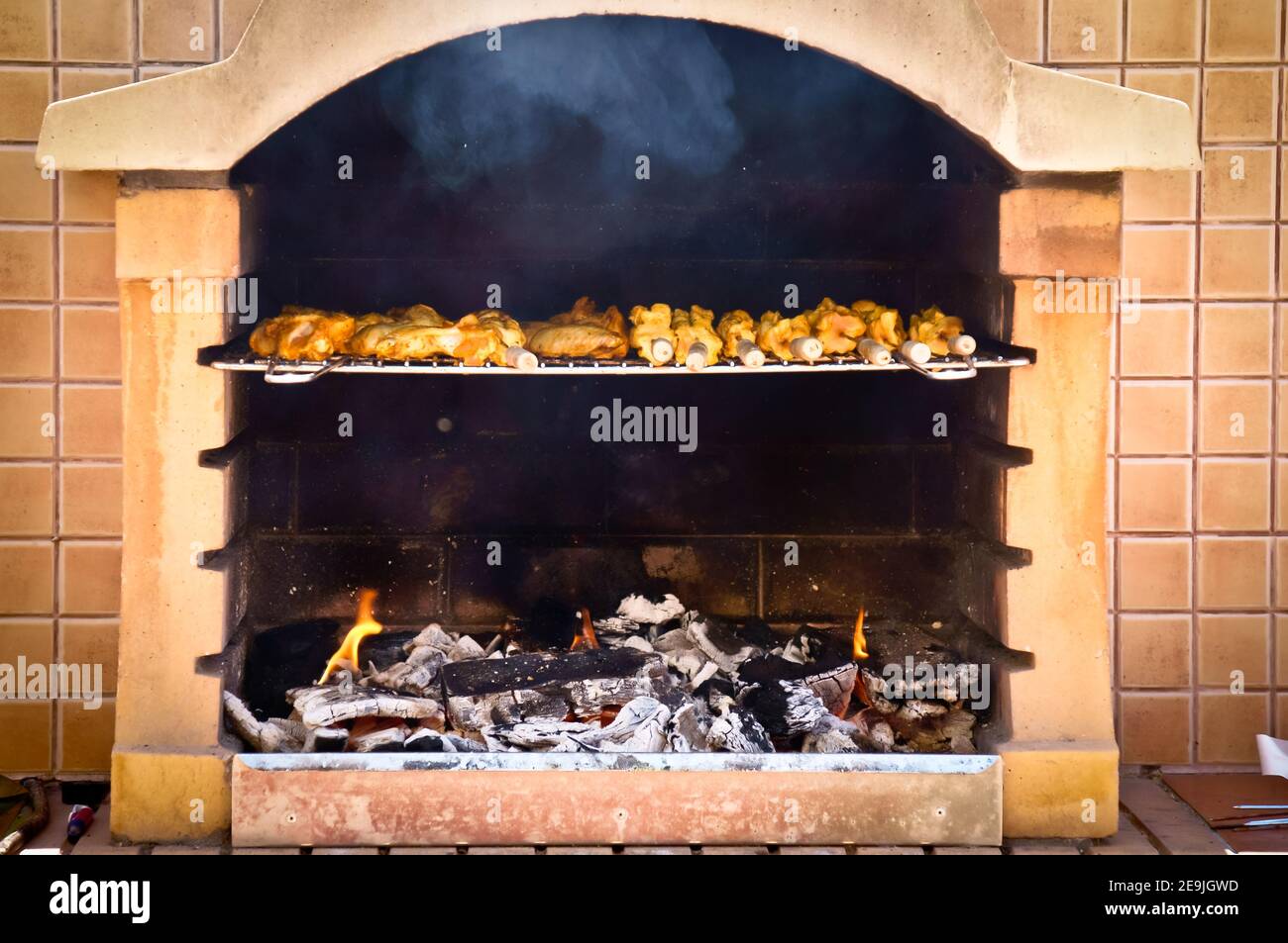 View of barbeque inside a brick griller Stock Photo - Alamy