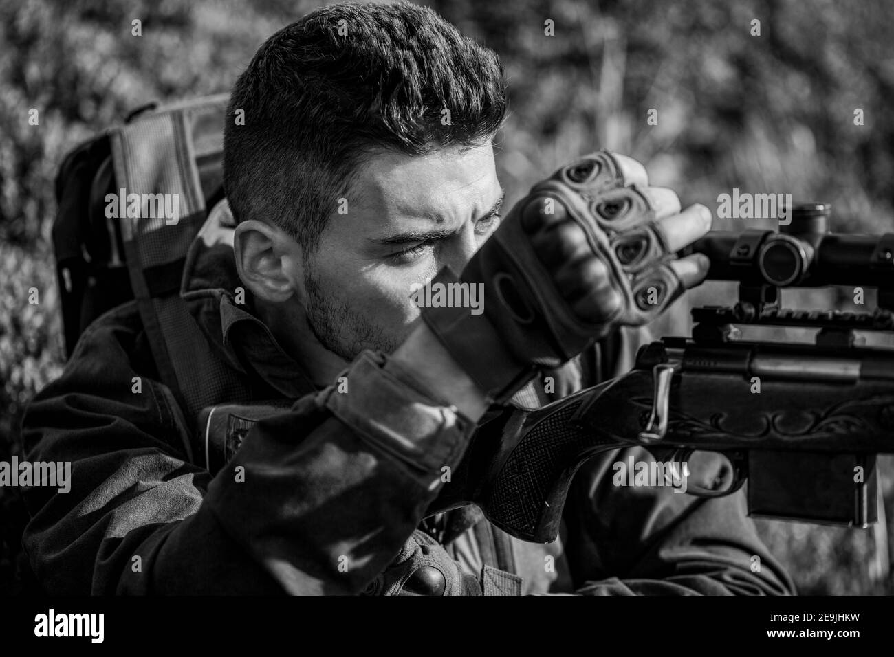 Hunt hunting rifle. Hunter man. Hunting period. Male with a gun. Close ...