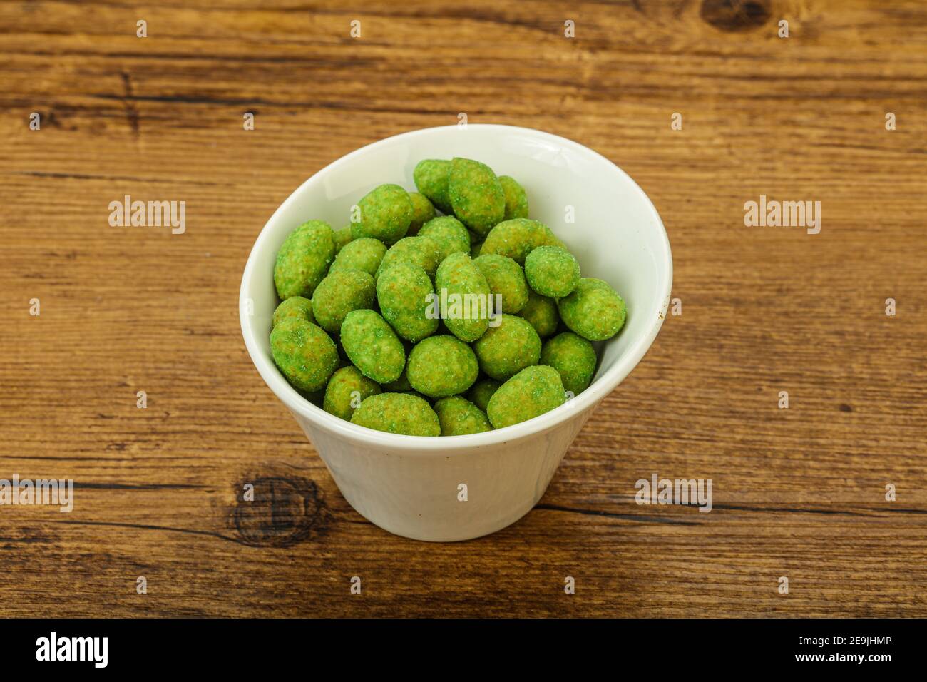 Spicy wasabi peanuts snack in the bowl Stock Photo - Alamy