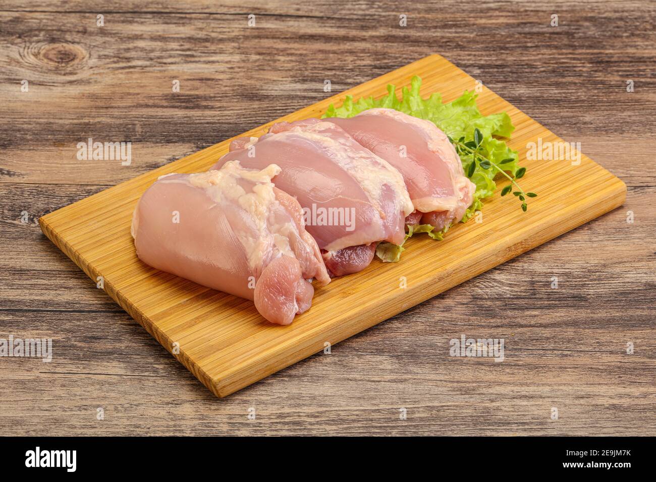 Raw chicken boneless and skinless leg for cooking Stock Photo - Alamy