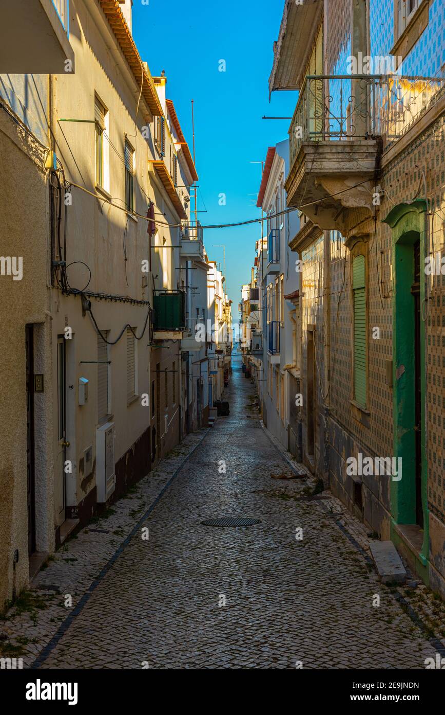 View of a narrow street in Nazare, Portugal Stock Photo - Alamy