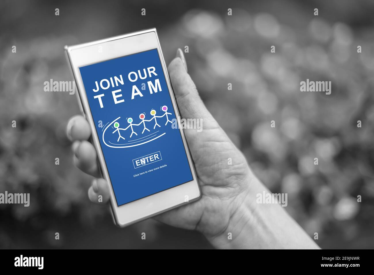 Female hand holding a smartphone with join our team concept Stock Photo ...