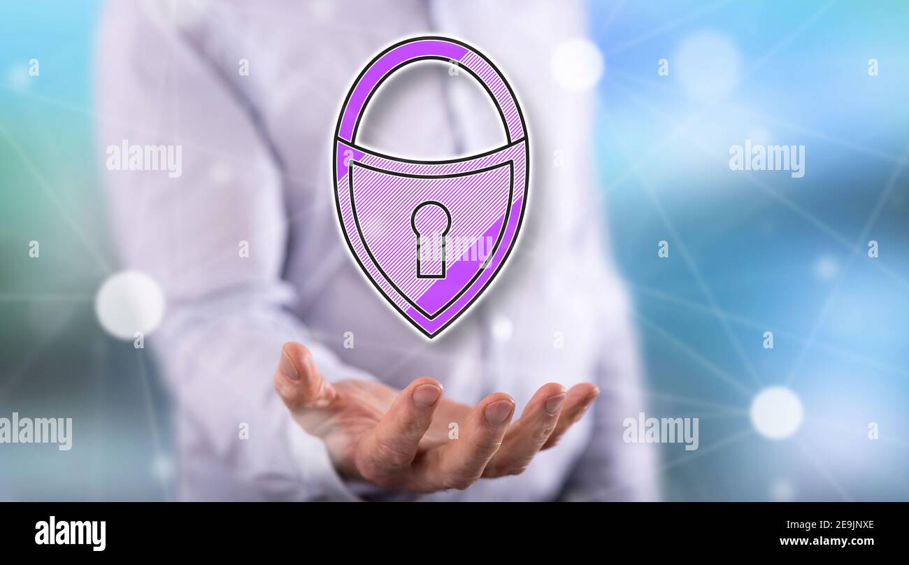 Cyber security concept above the hand of a man in background Stock ...